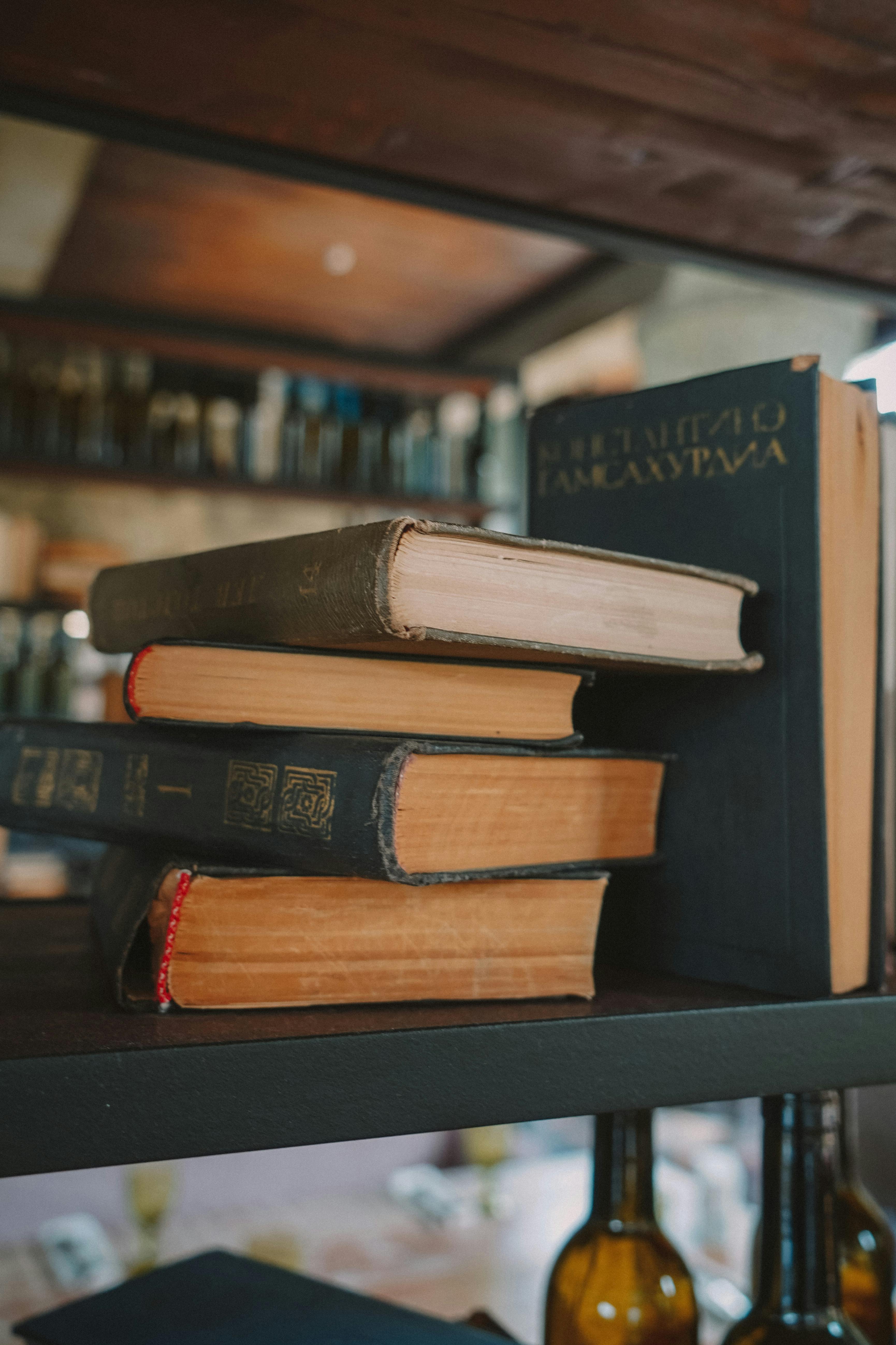 Close Up Photo Books on a Shelf · Free Stock Photo