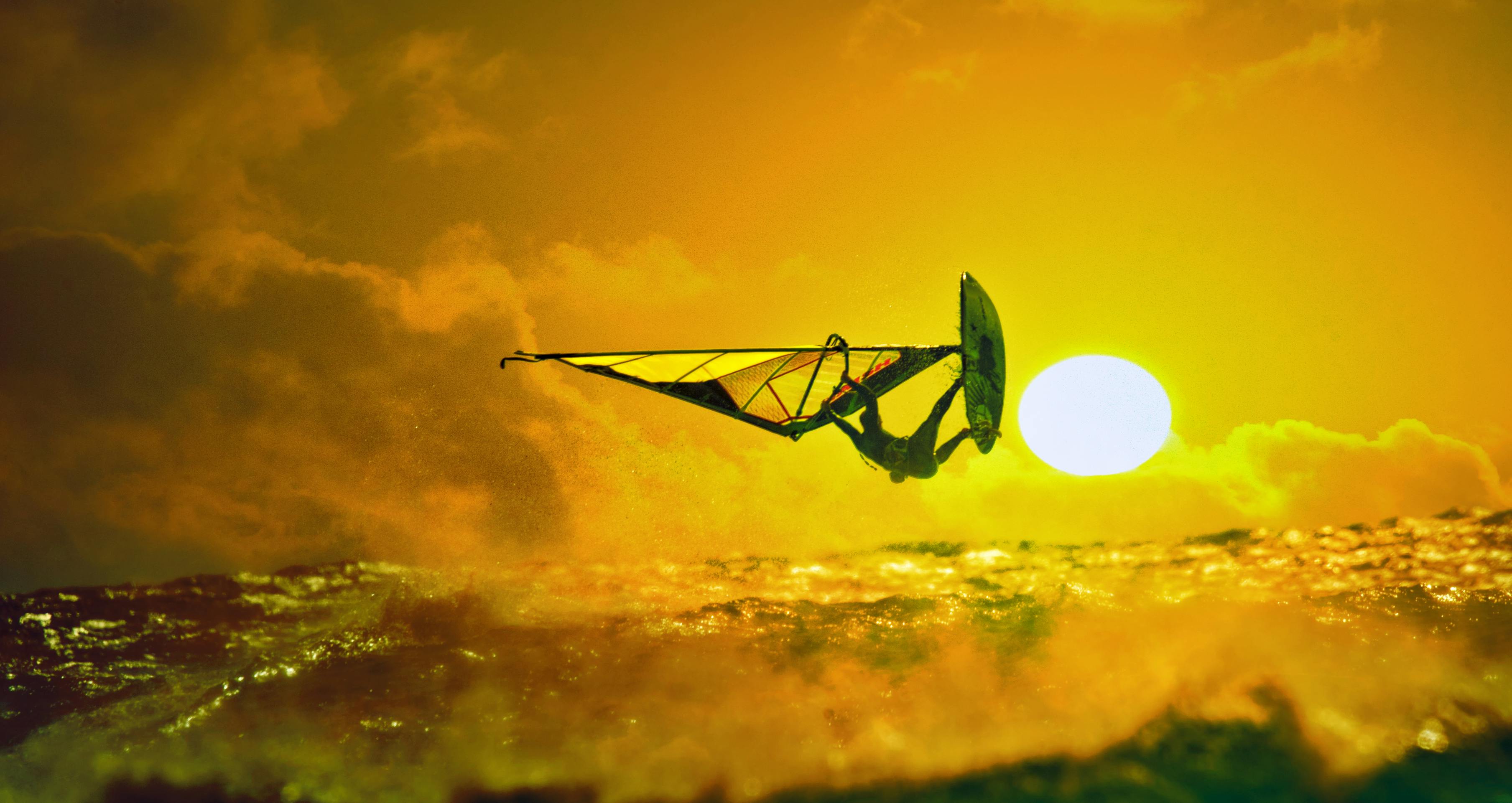 Windsurfer Jumping at Dawn · Free Stock Photo