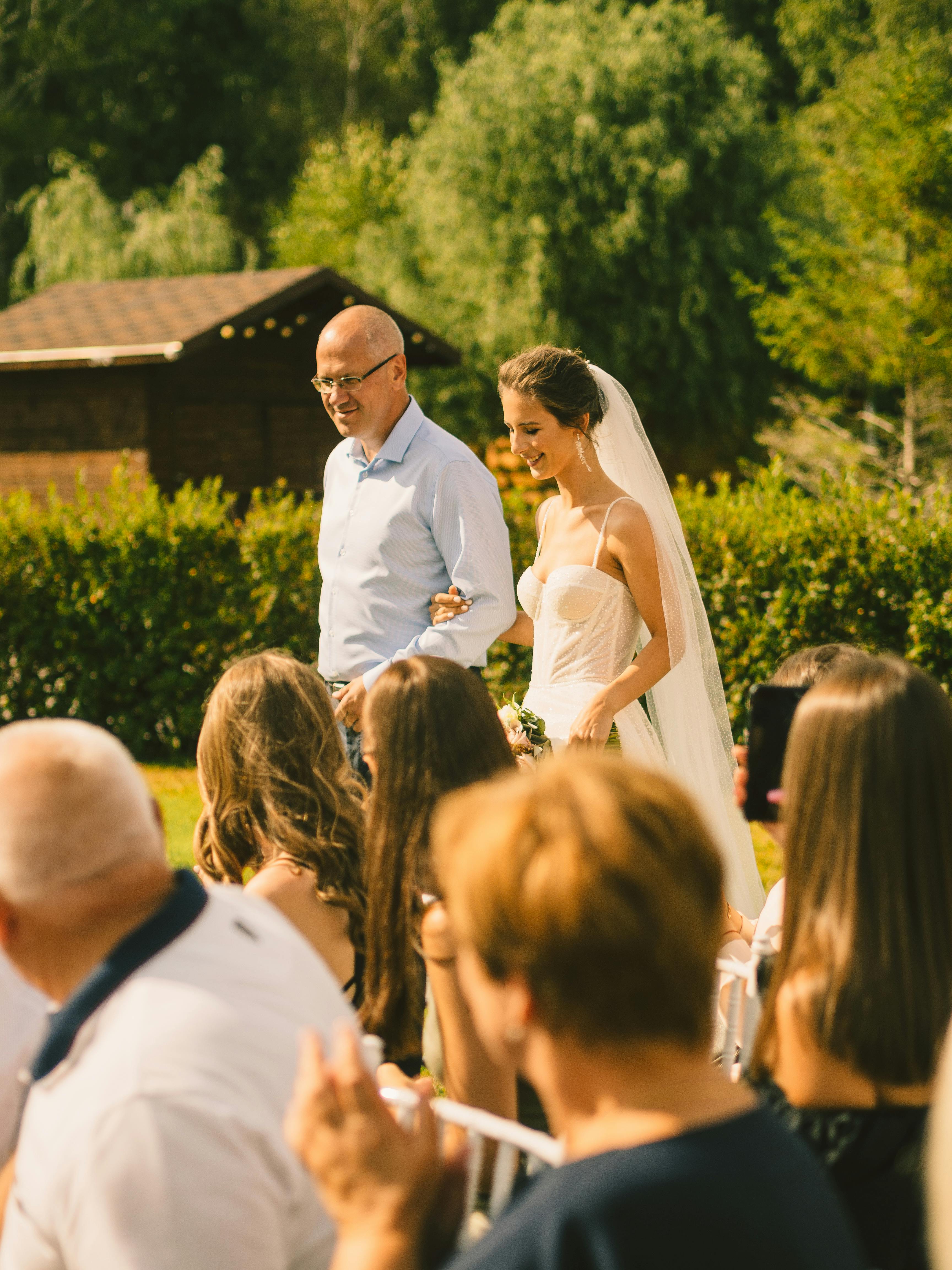 A Father Walking Her Daughter on Her Wedding Day · Free Stock Photo