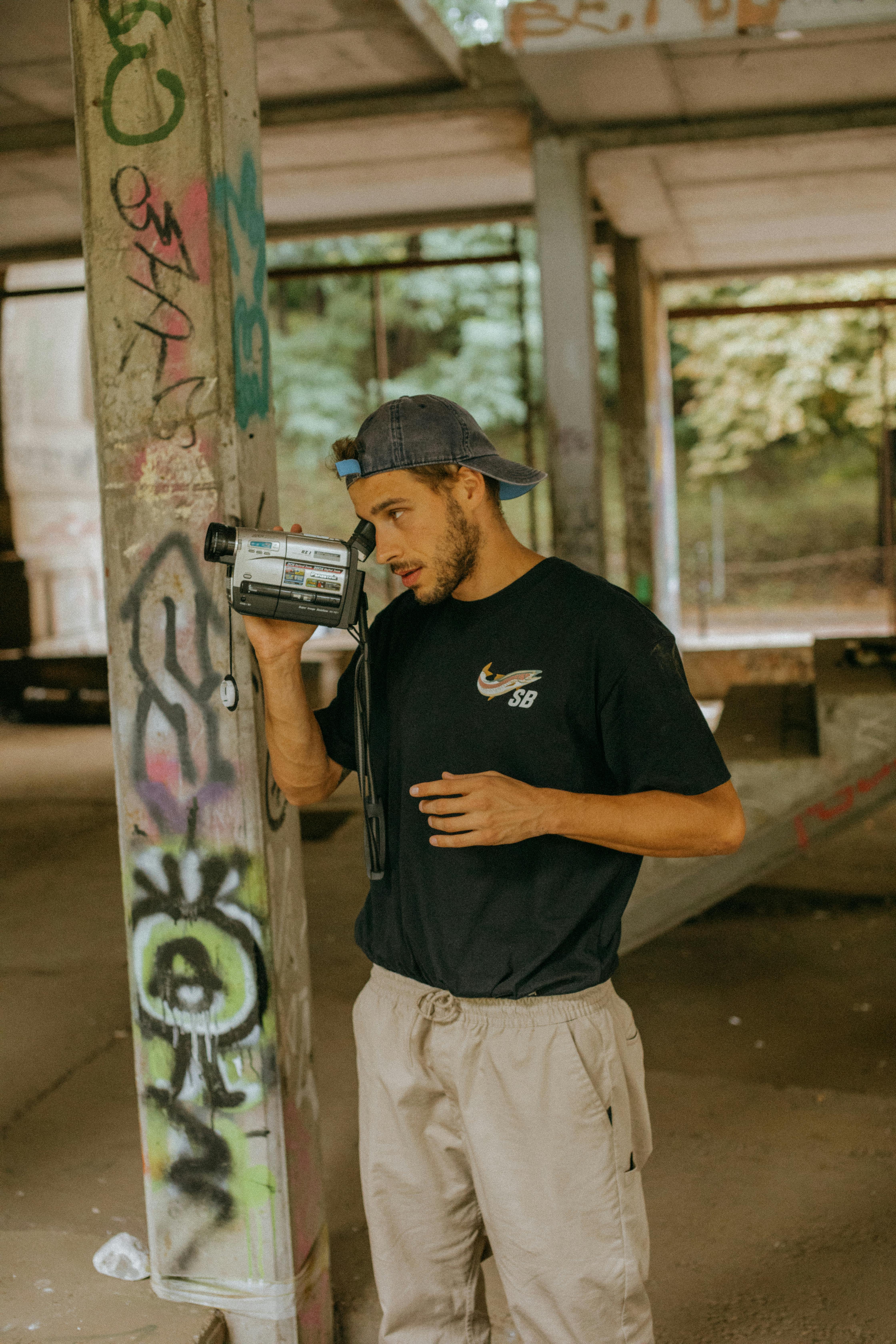 Man filming with camera at skatepark · Free Stock Photo