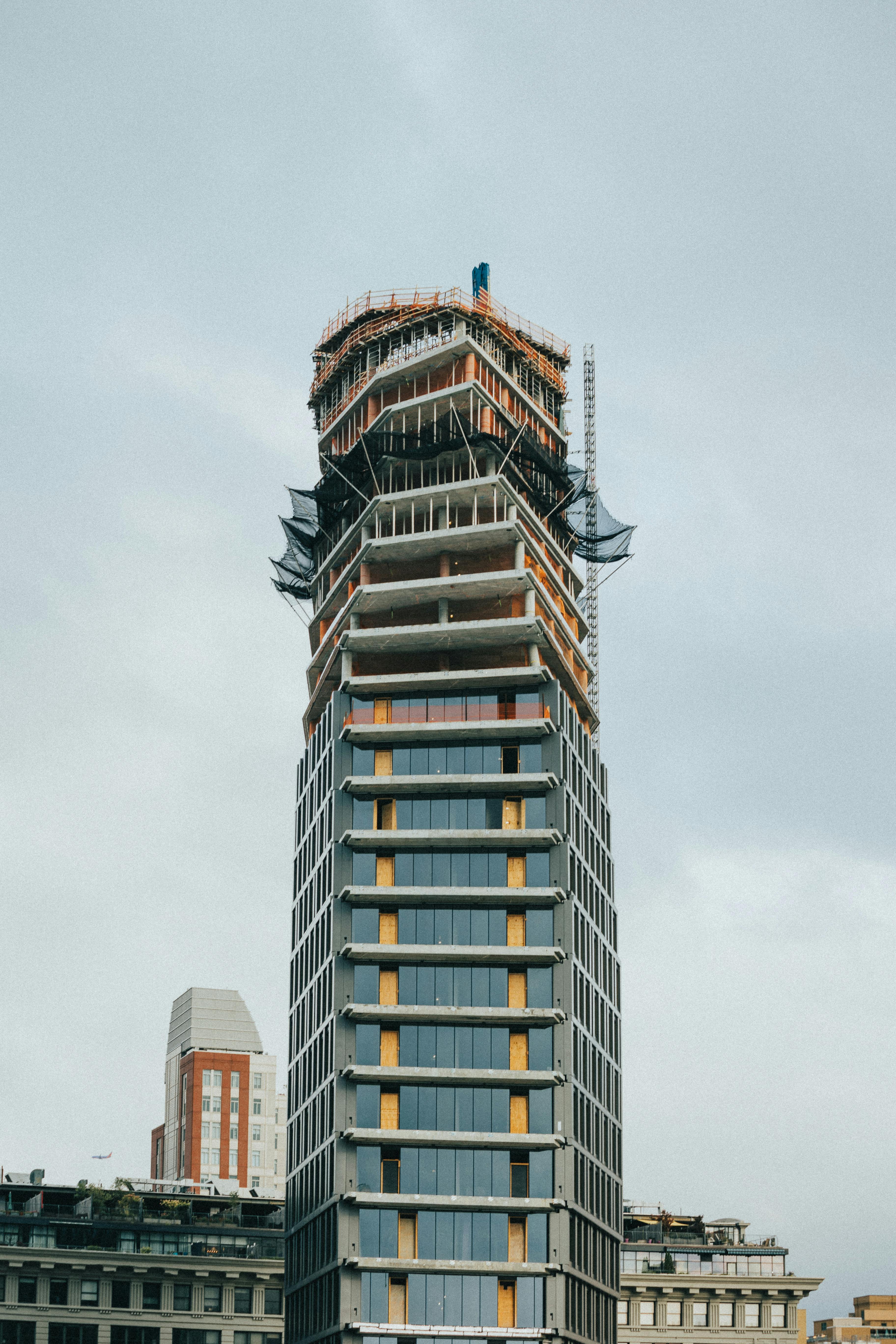 A Tall Glass Building under the White Sky · Free Stock Photo
