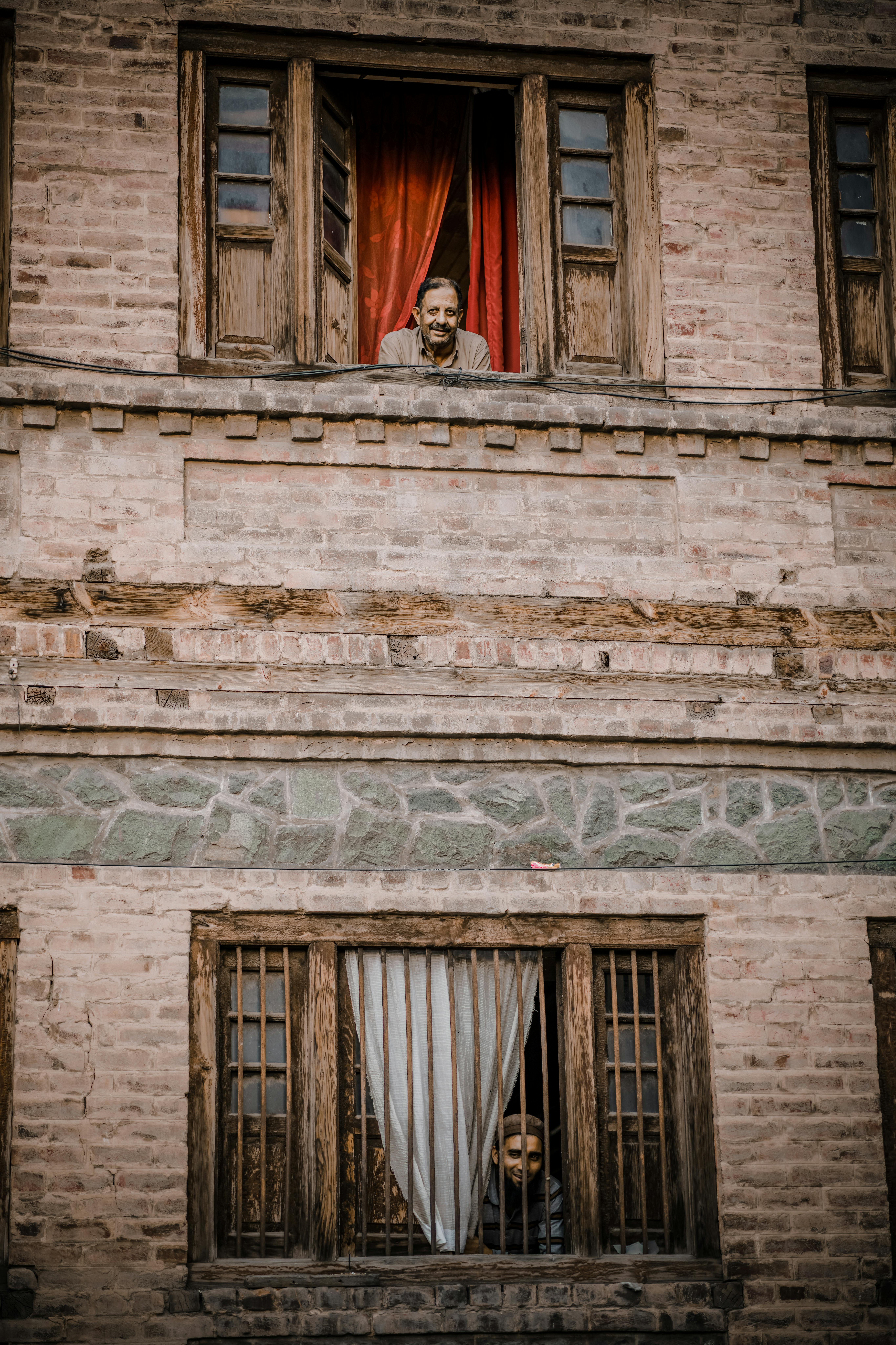 Men Behind Wooden Windows · Free Stock Photo