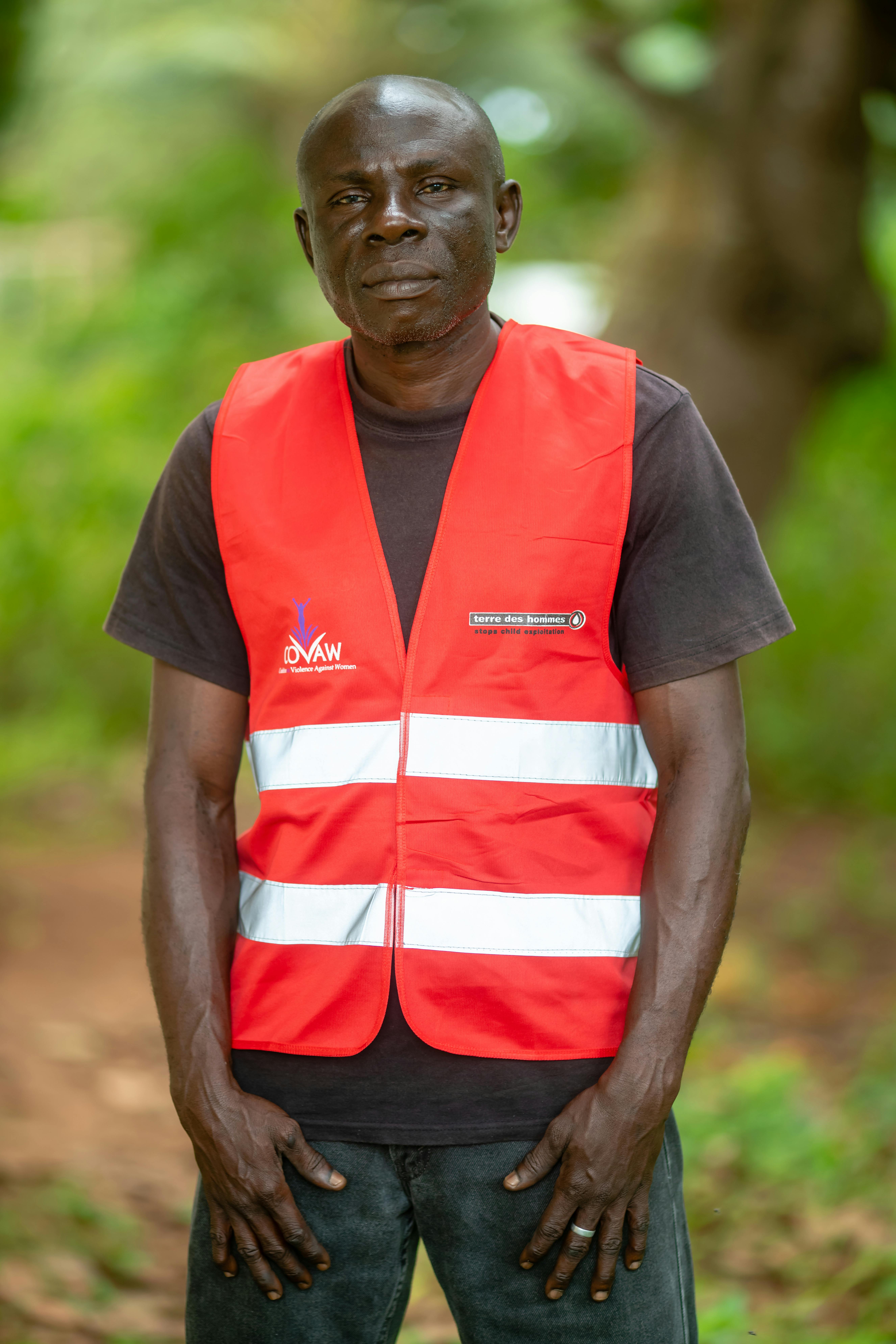 Man in Red and White Safety Vest · Free Stock Photo