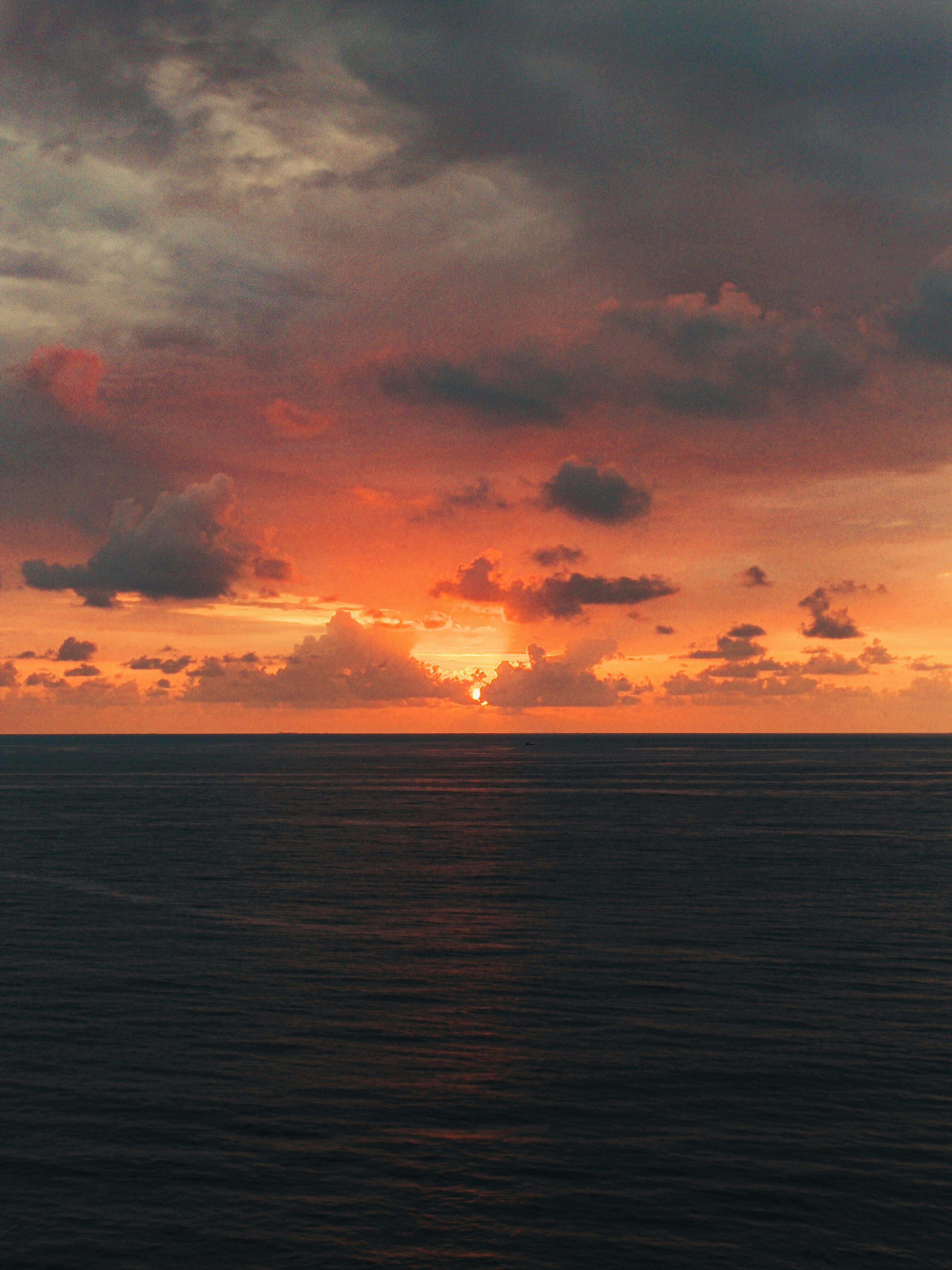 Beautiful Scenery of Placid Sea during Sunset · Free Stock Photo