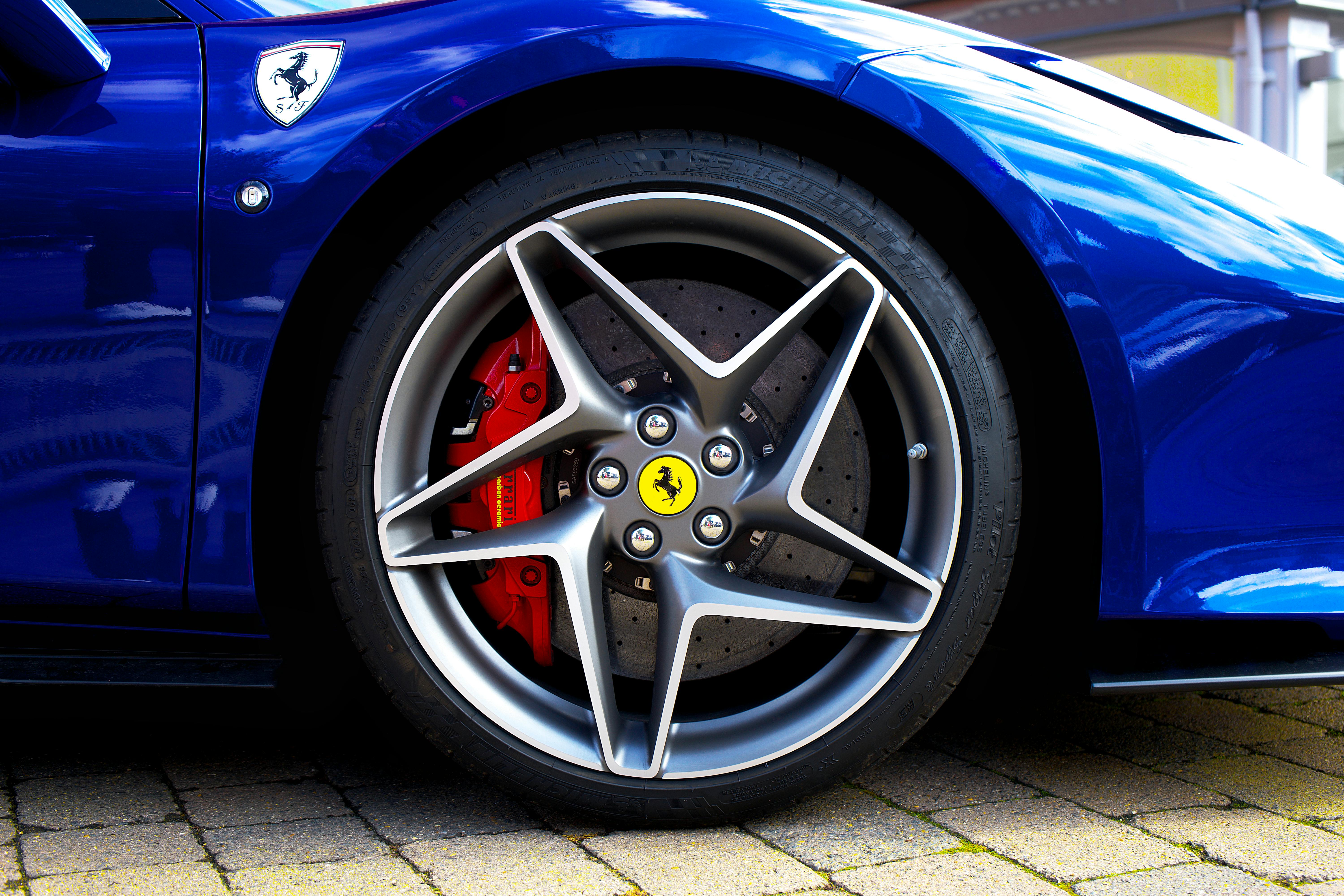 Close-Up Photo of Ferrari Rim · Free Stock Photo