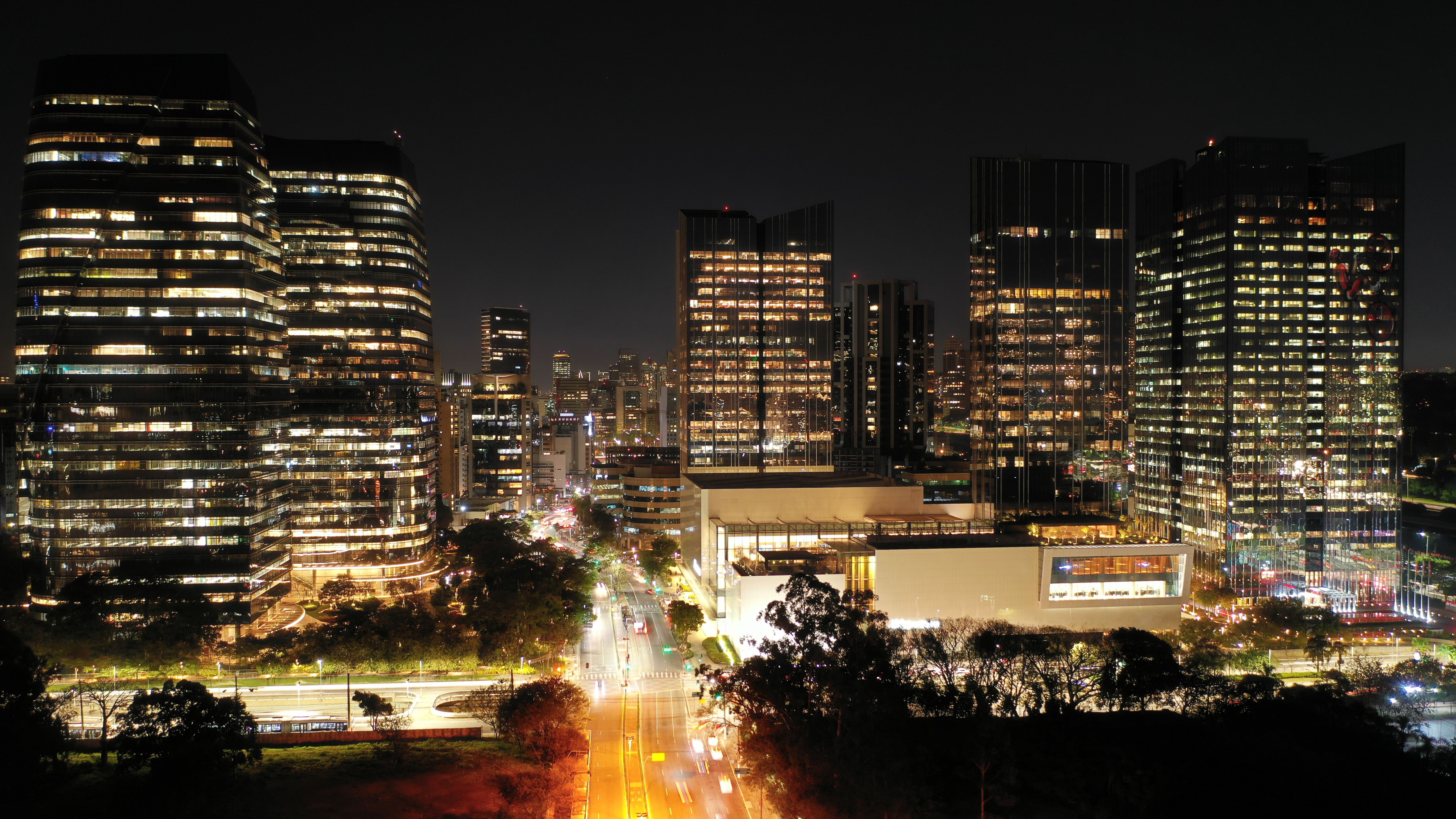 Aerial View of City With High Rise Building at Night Time · Free Stock ...