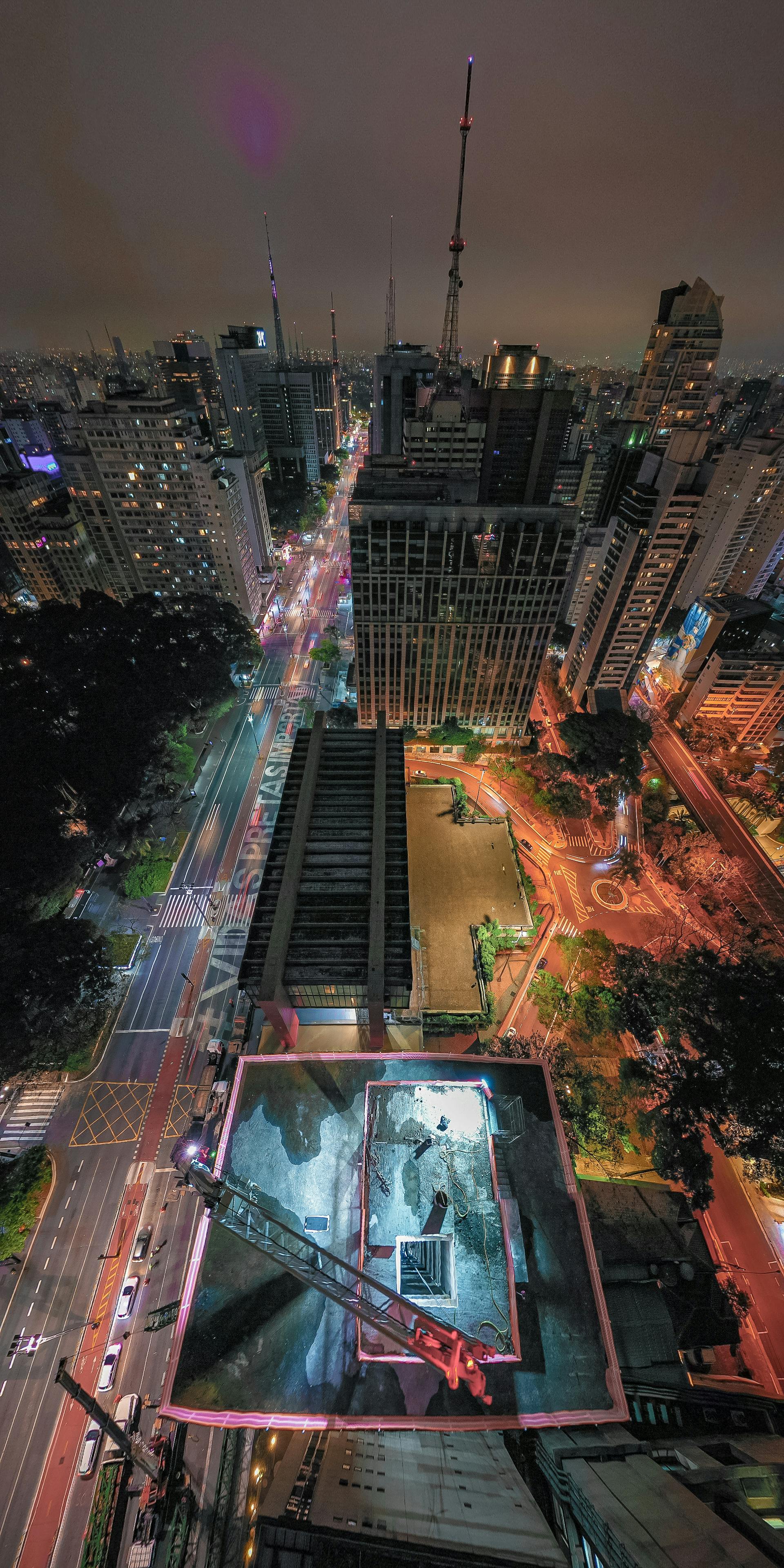 High-Rise Buildings at Night · Free Stock Photo