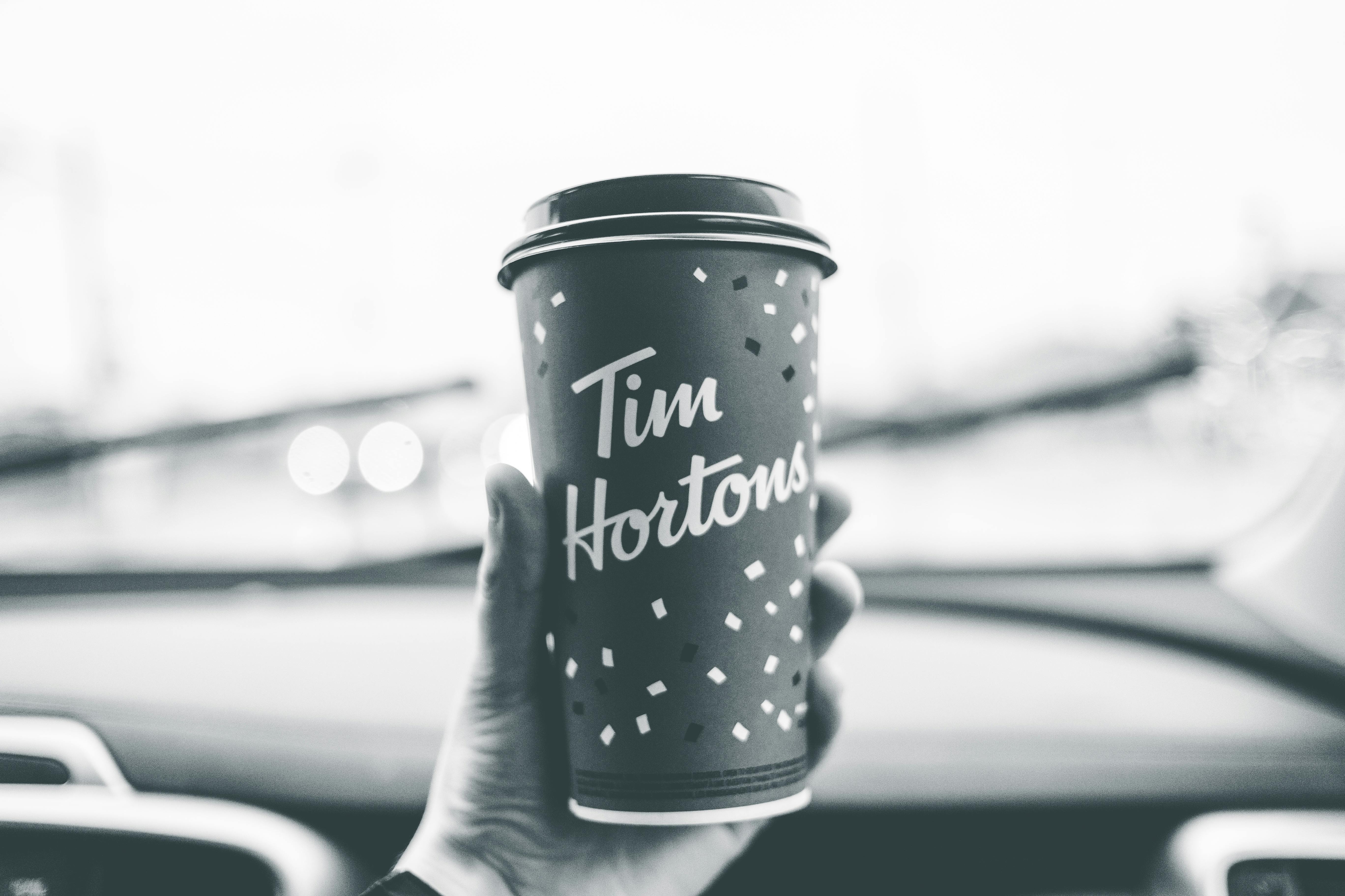 A Grayscale of Cup of Coffee · Free Stock Photo