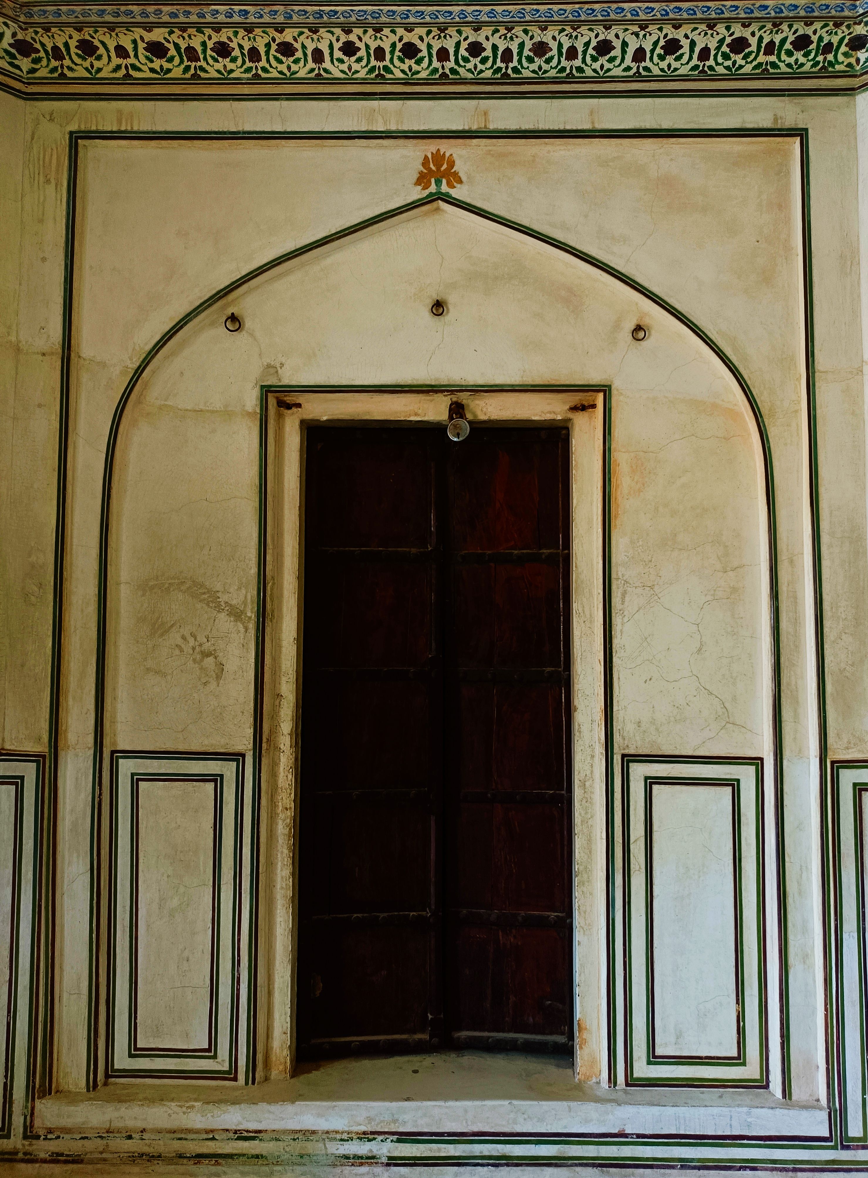 A Brown Wooden Door Propped Open · Free Stock Photo