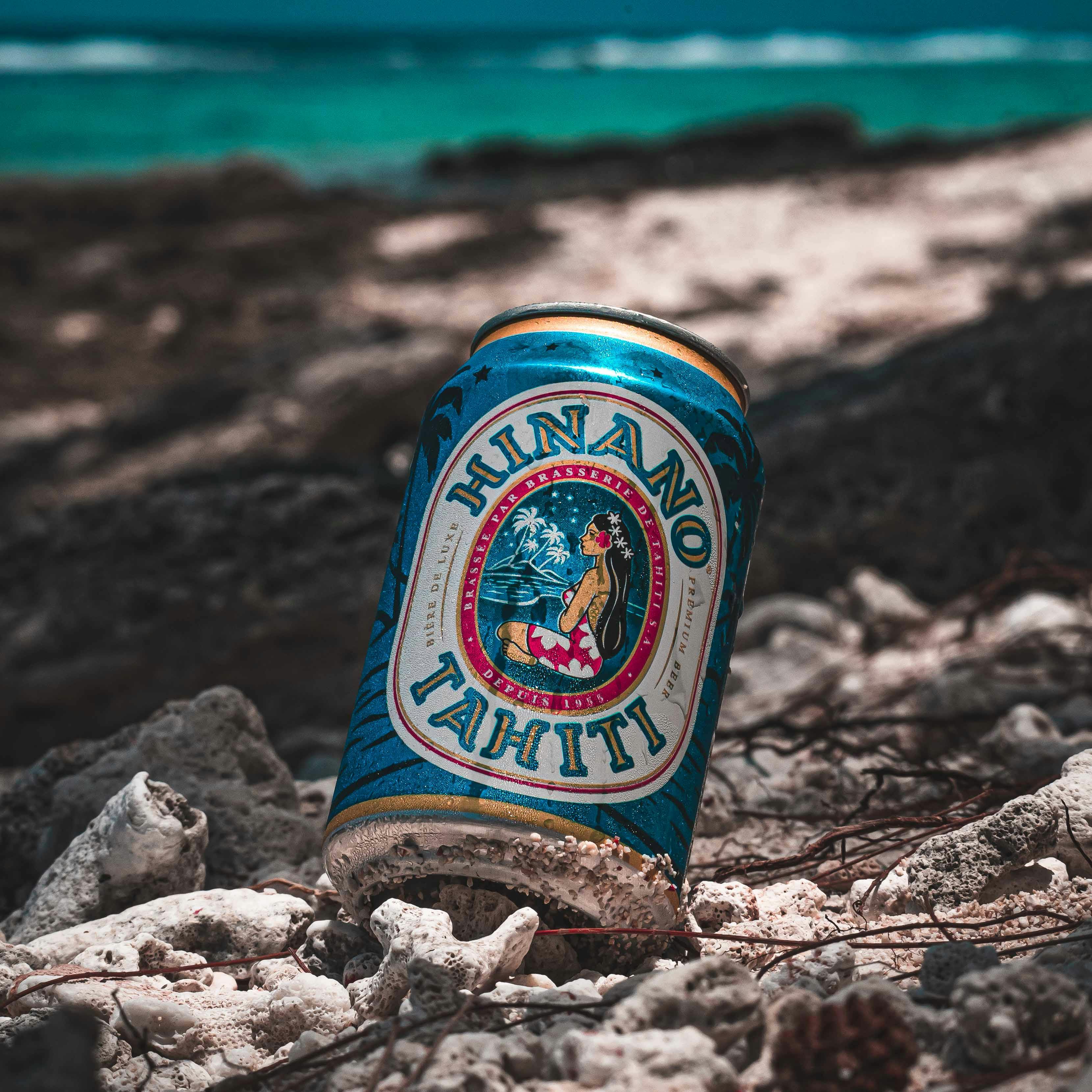 Blue and Red Can on the Ground · Free Stock Photo