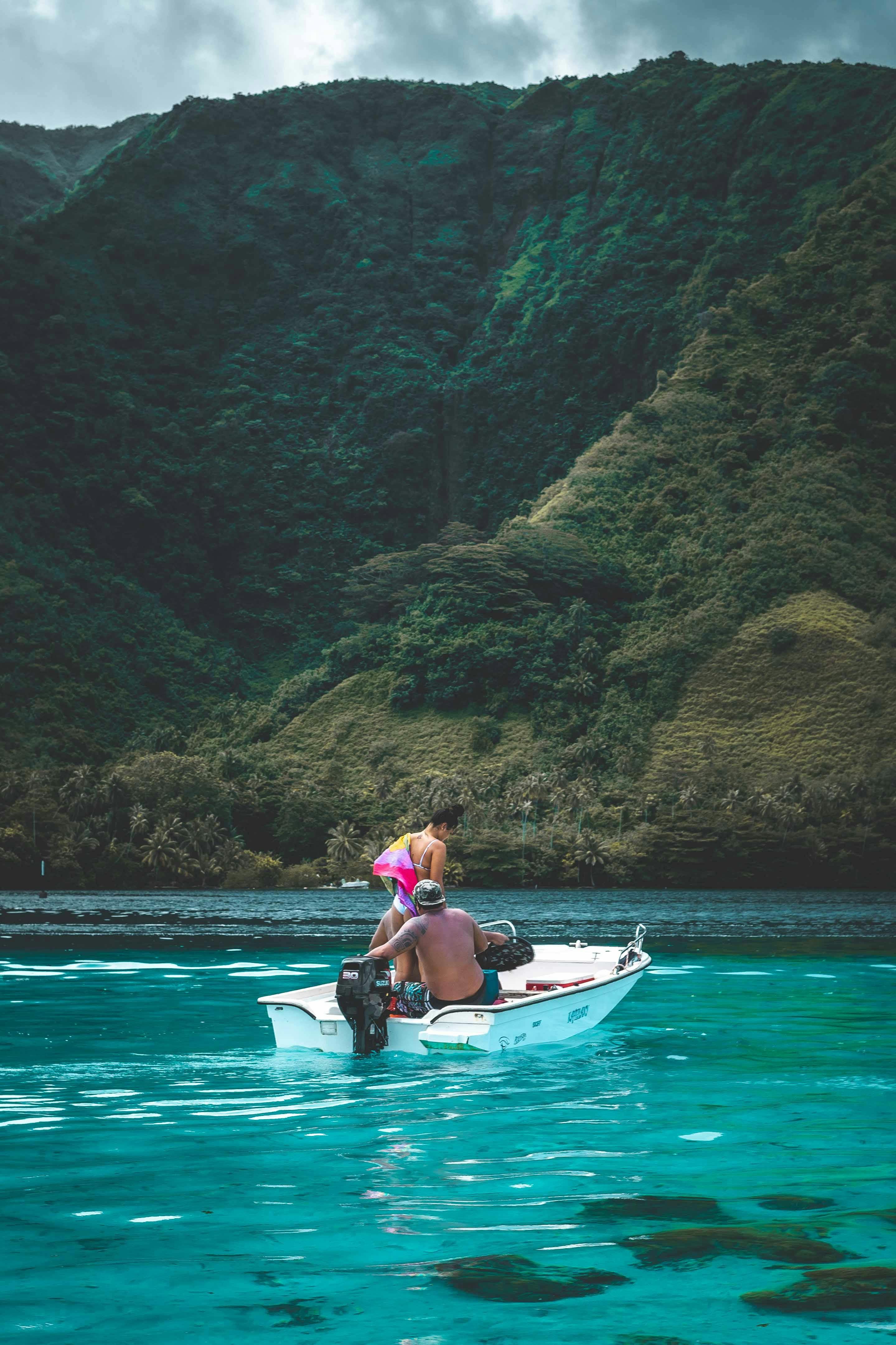 People Riding a Motorboat · Free Stock Photo
