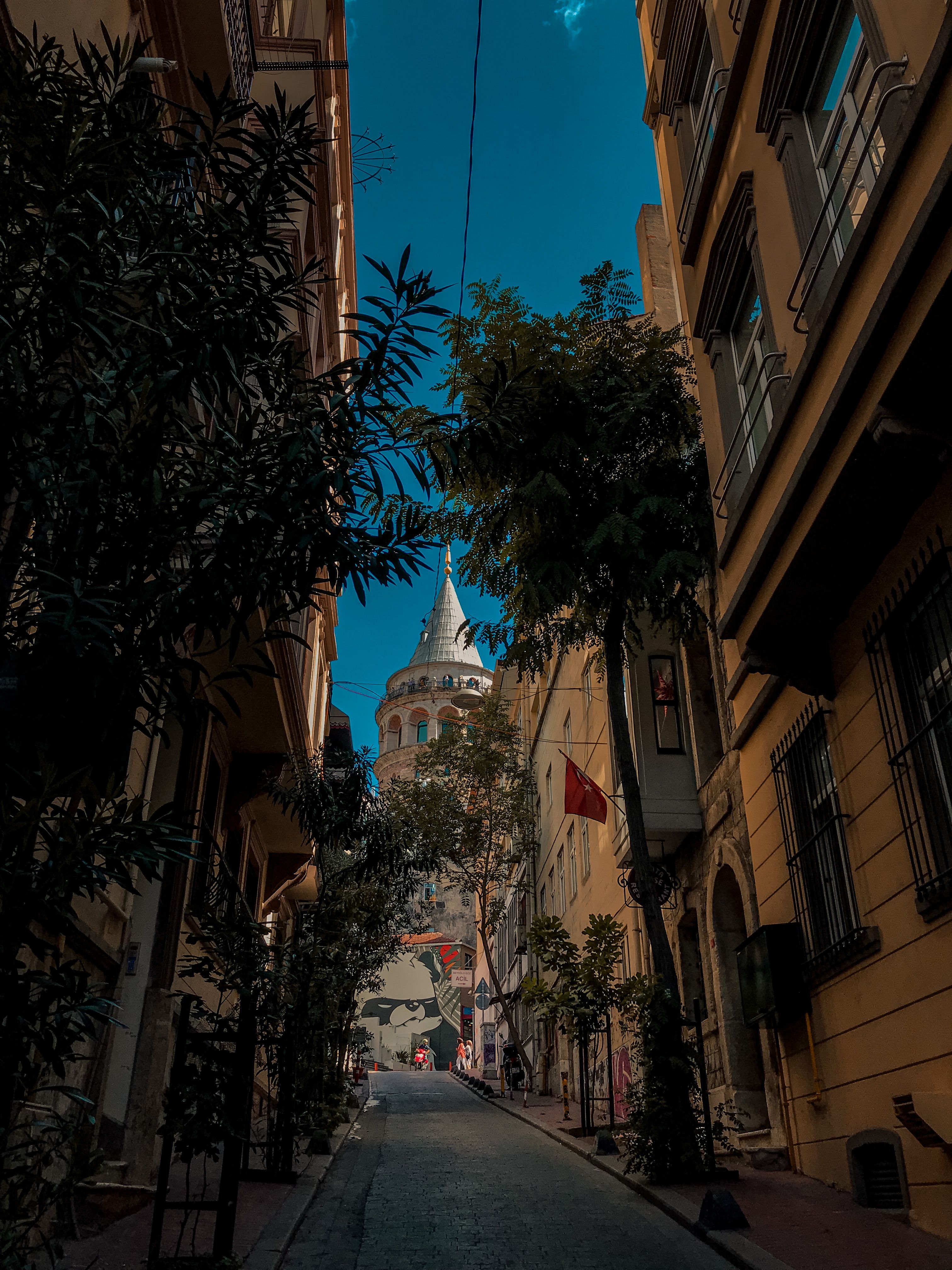 Street in between Buildings with Tower View · Free Stock Photo