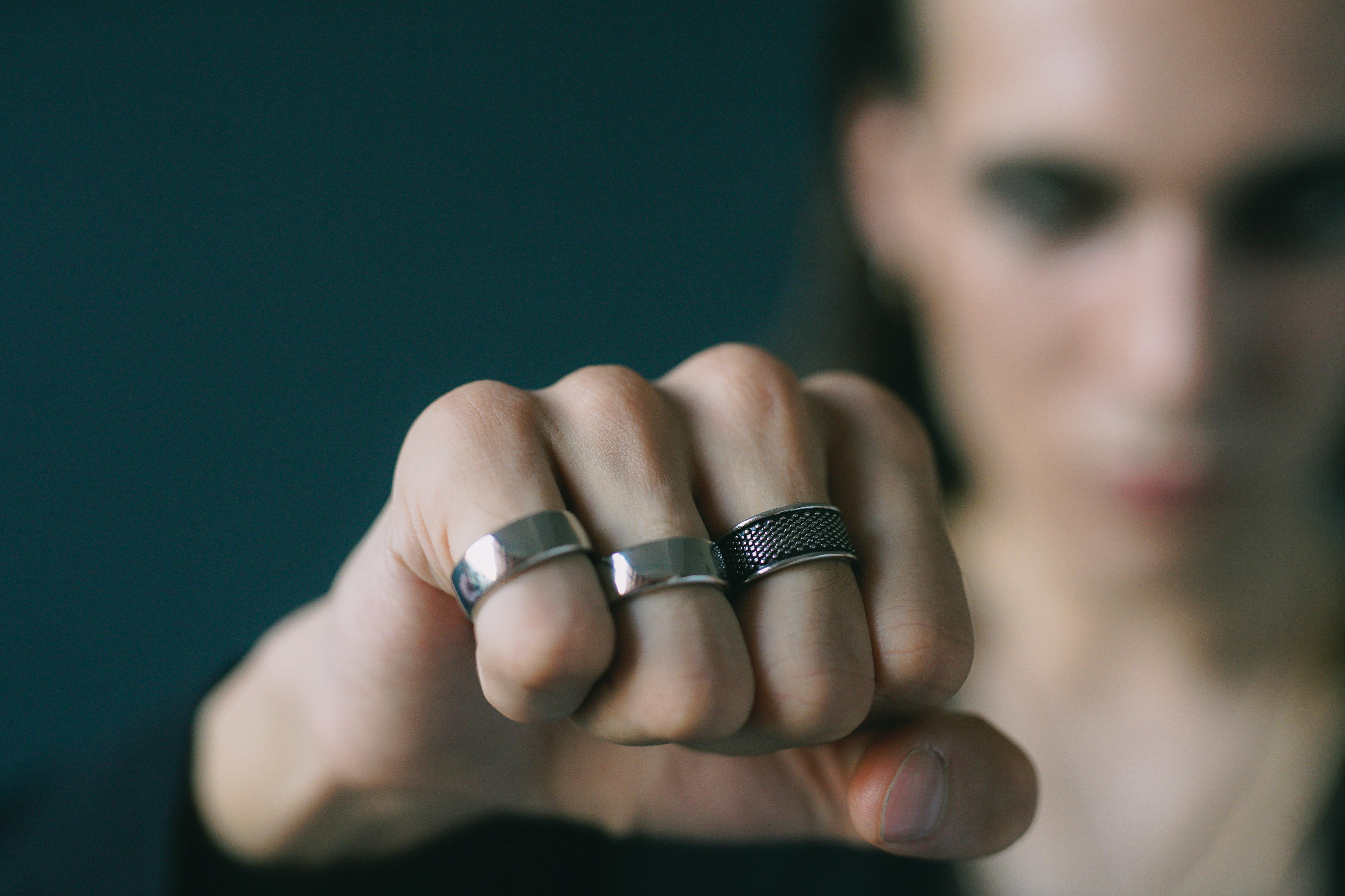 Clenched fist with rings · Free Stock Photo