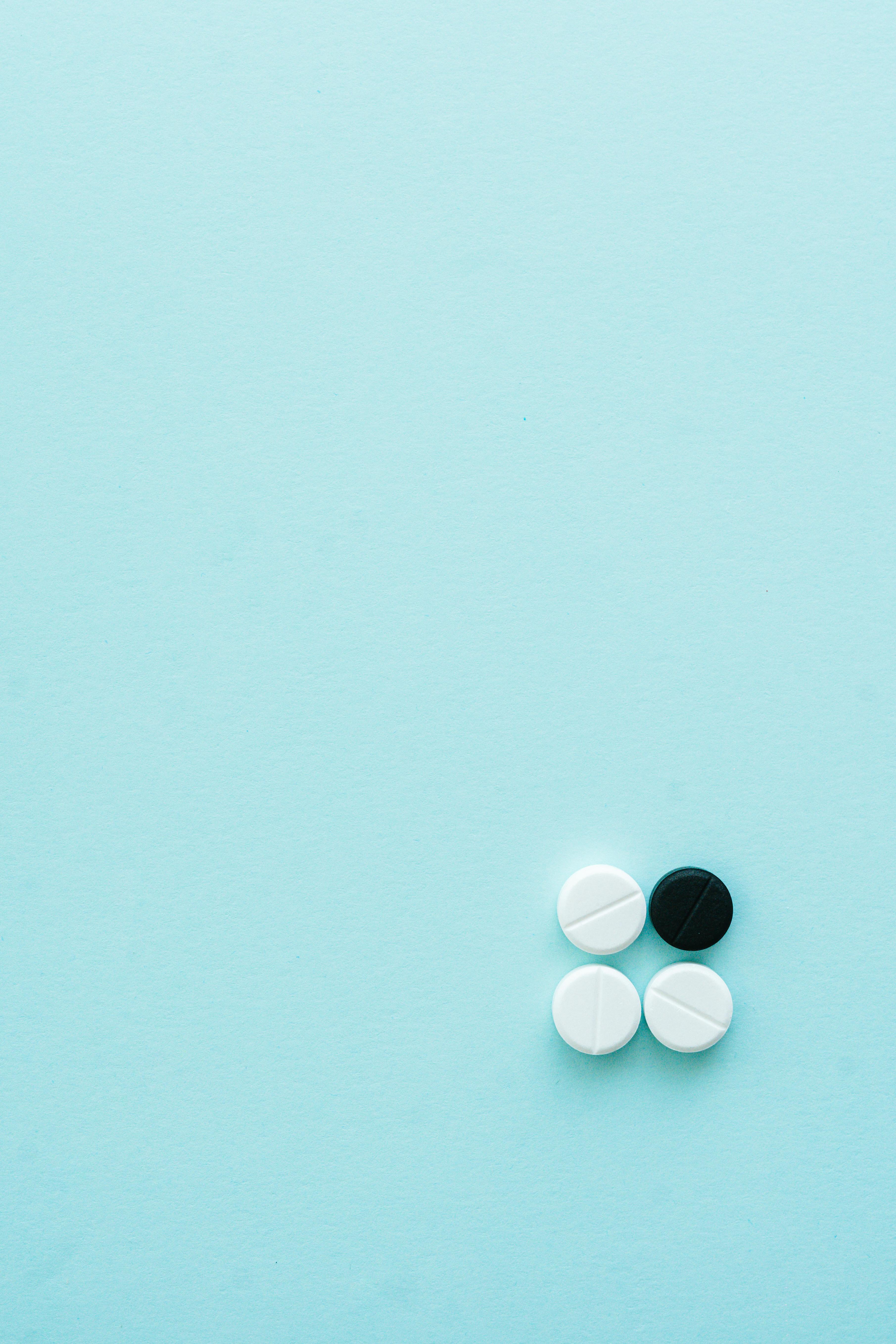 Medicine on Baby Blue Surface · Free Stock Photo