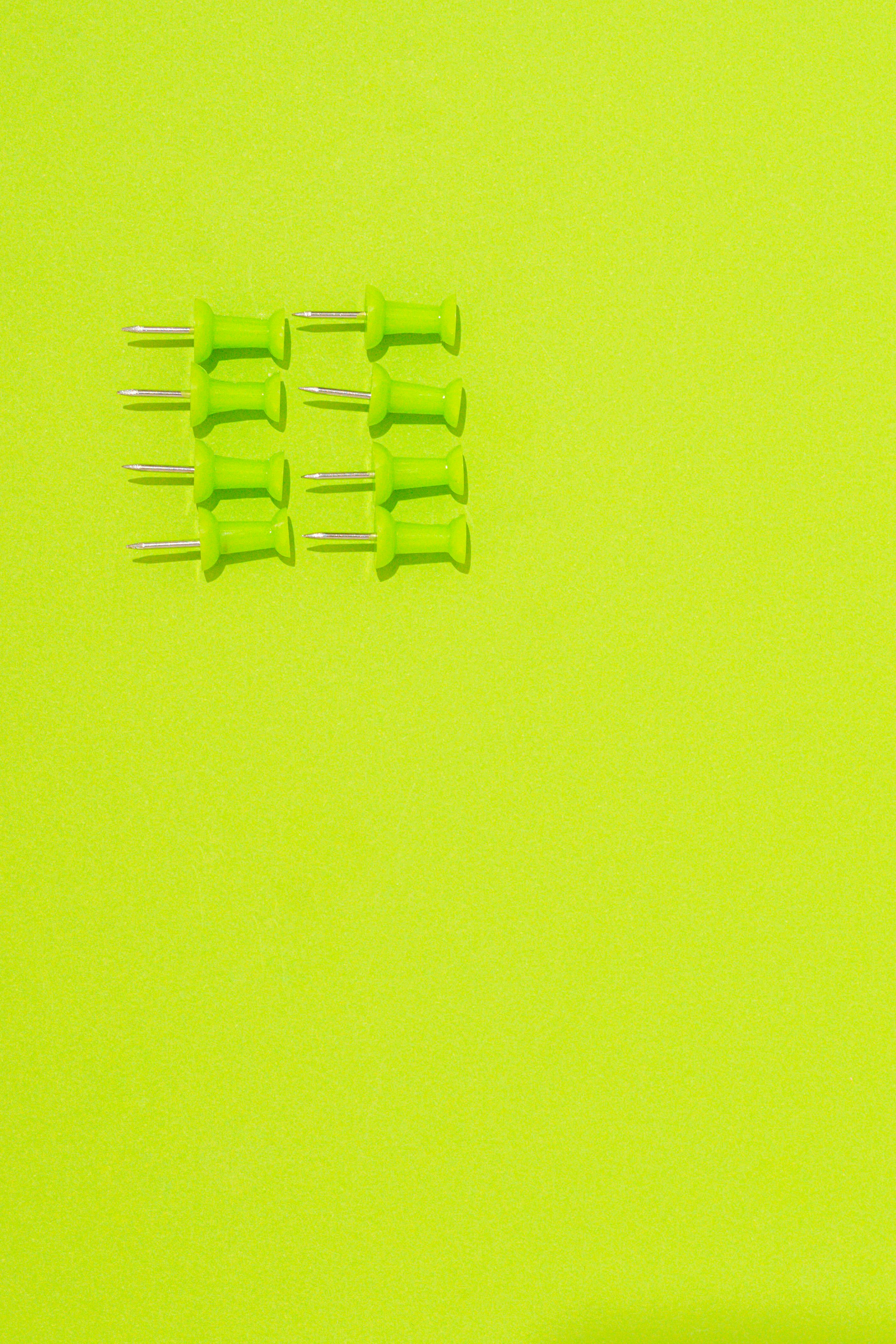 Pins on a Green Surface · Free Stock Photo