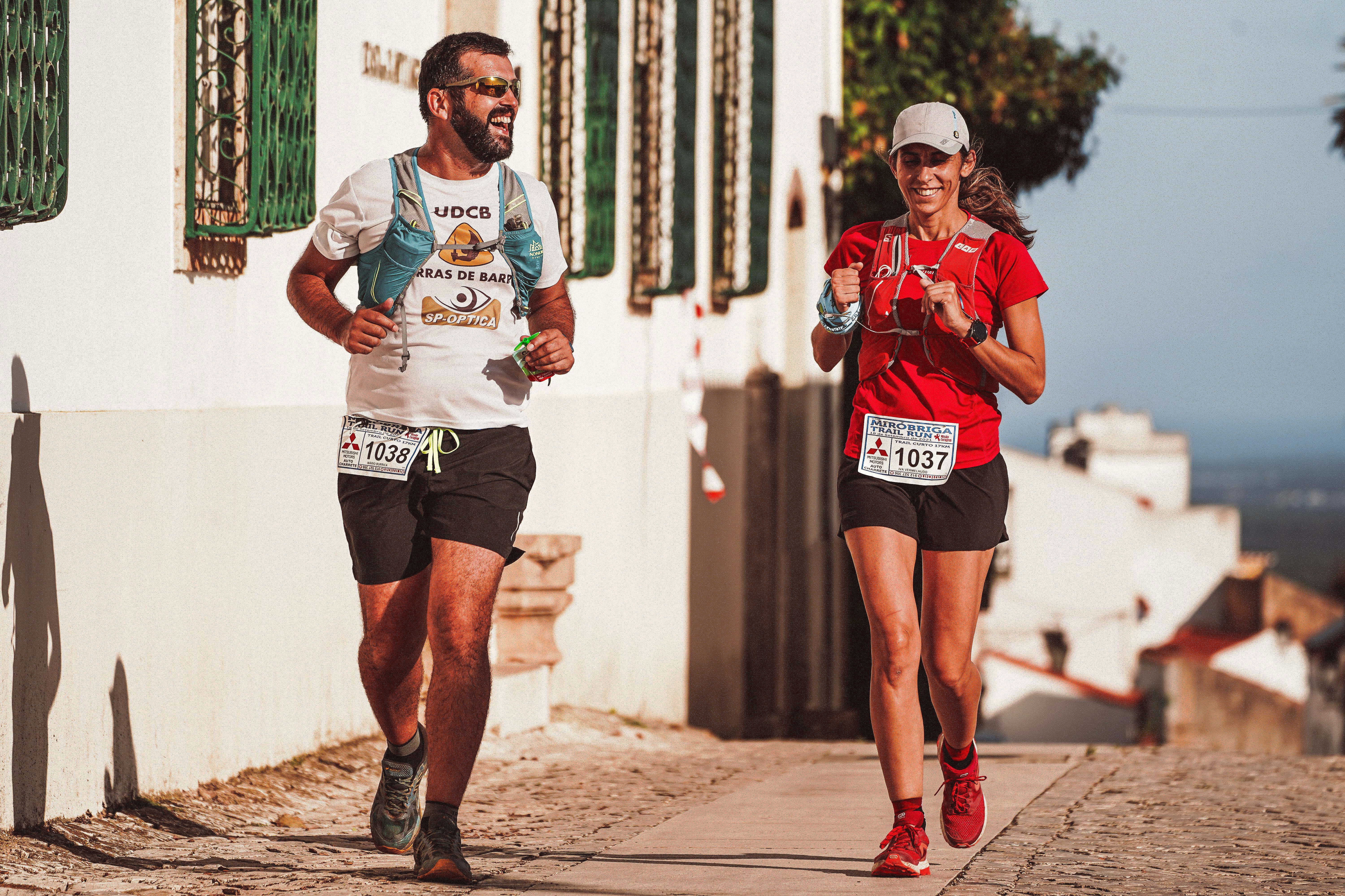 Athletes Running on the Street · Free Stock Photo