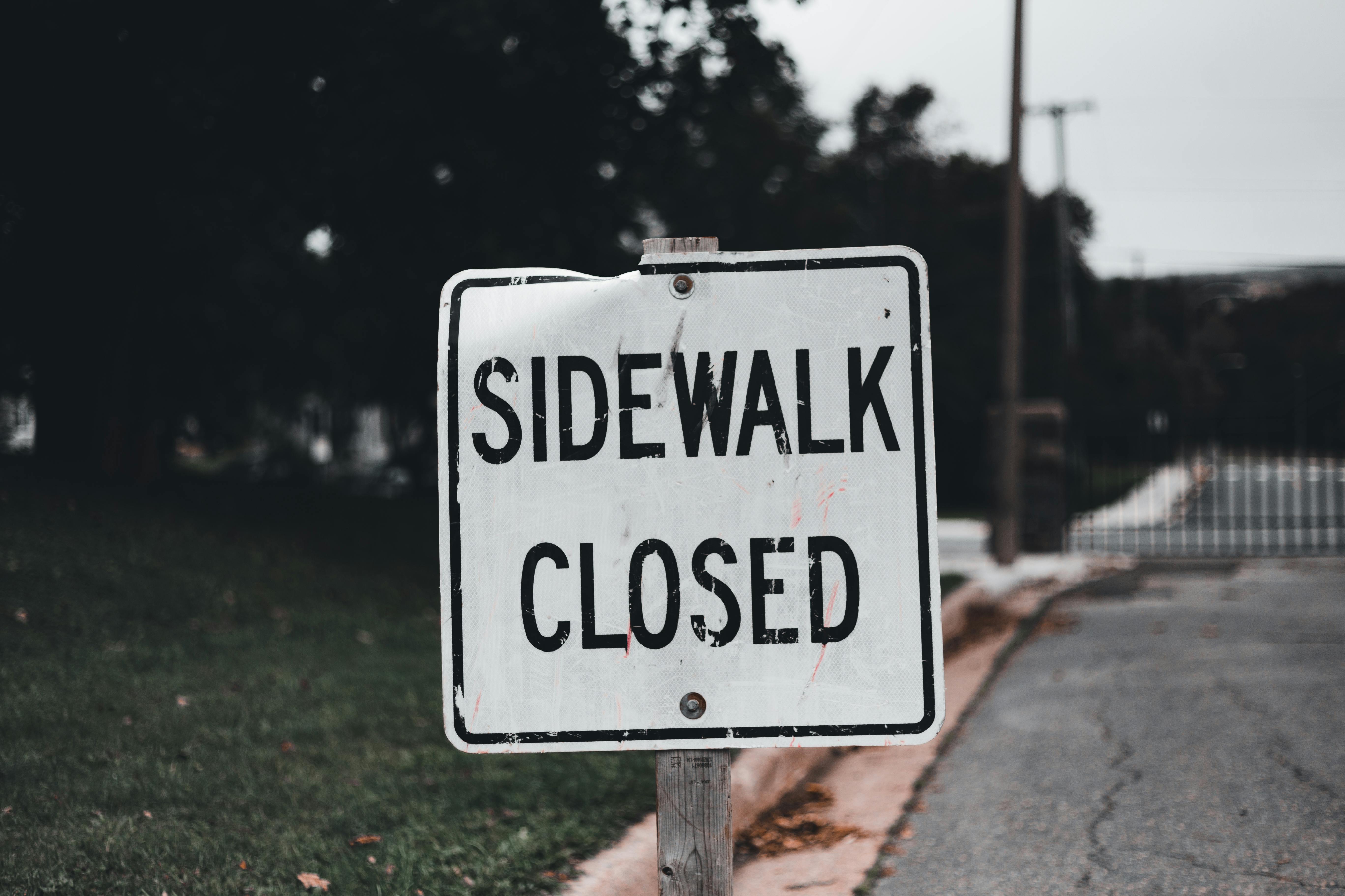 Board with a Text about Breaking the Law · Free Stock Photo