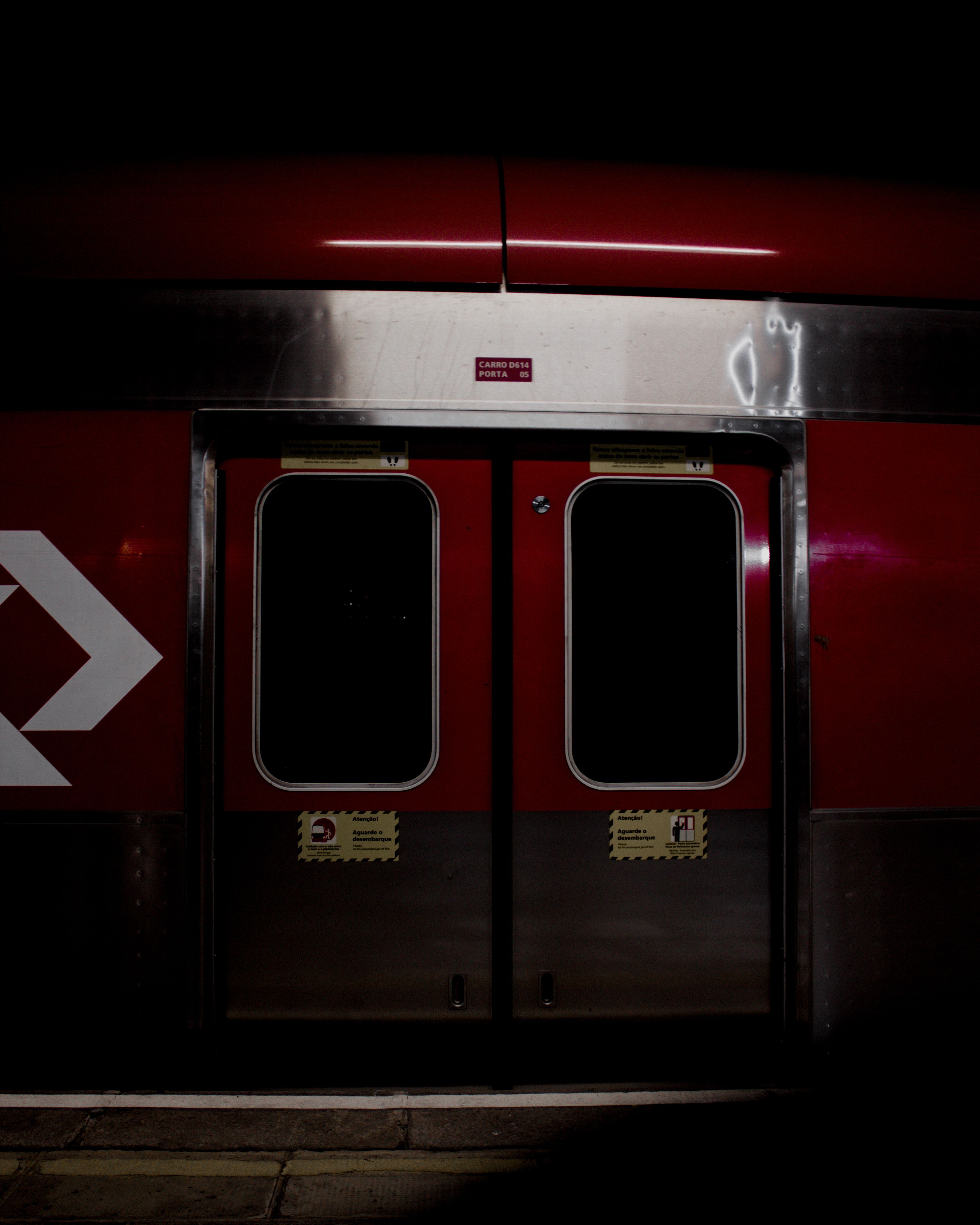 Old Train Interior with Exit Sign · Free Stock Photo