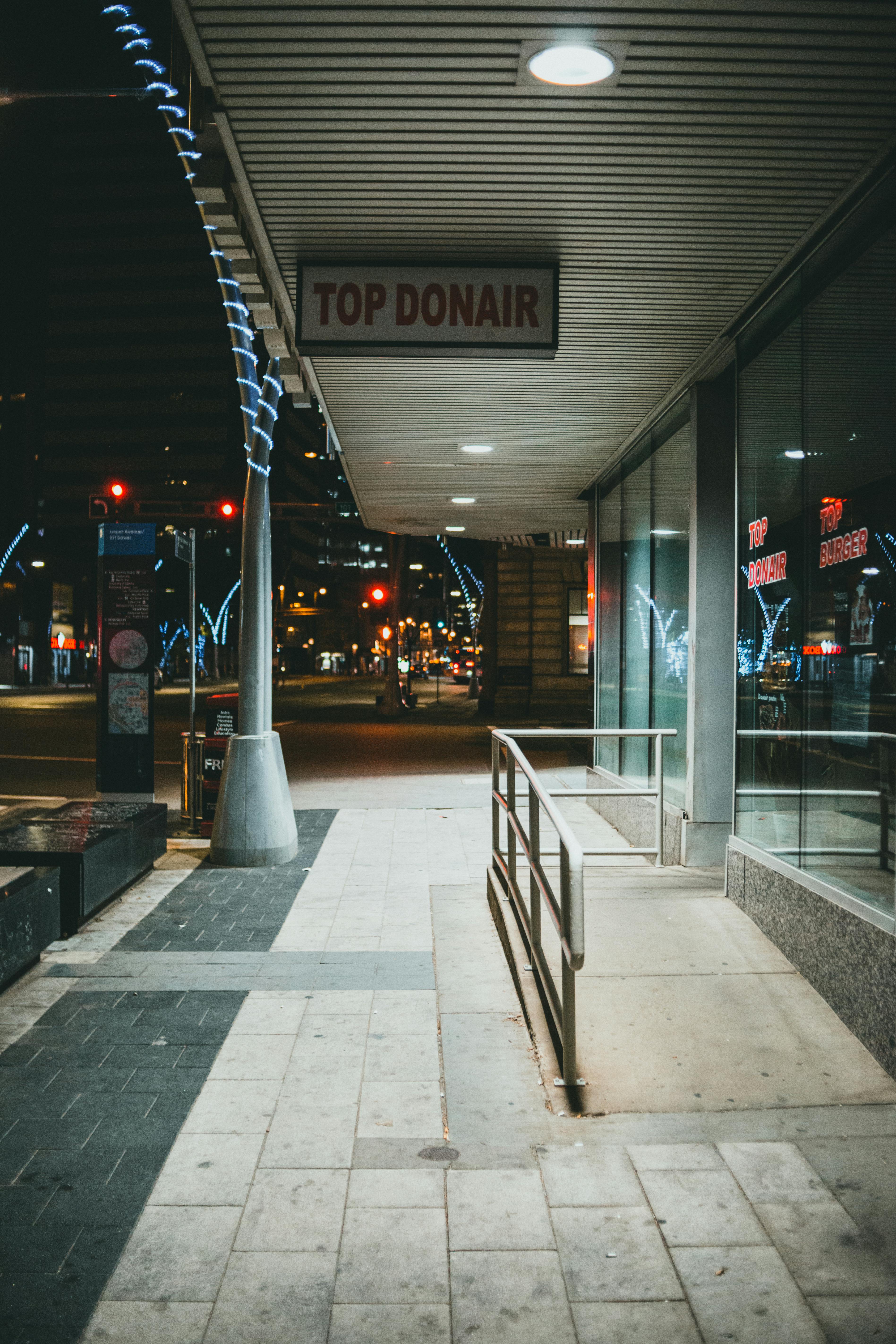 Shopping Cart on the Sidewalk · Free Stock Photo