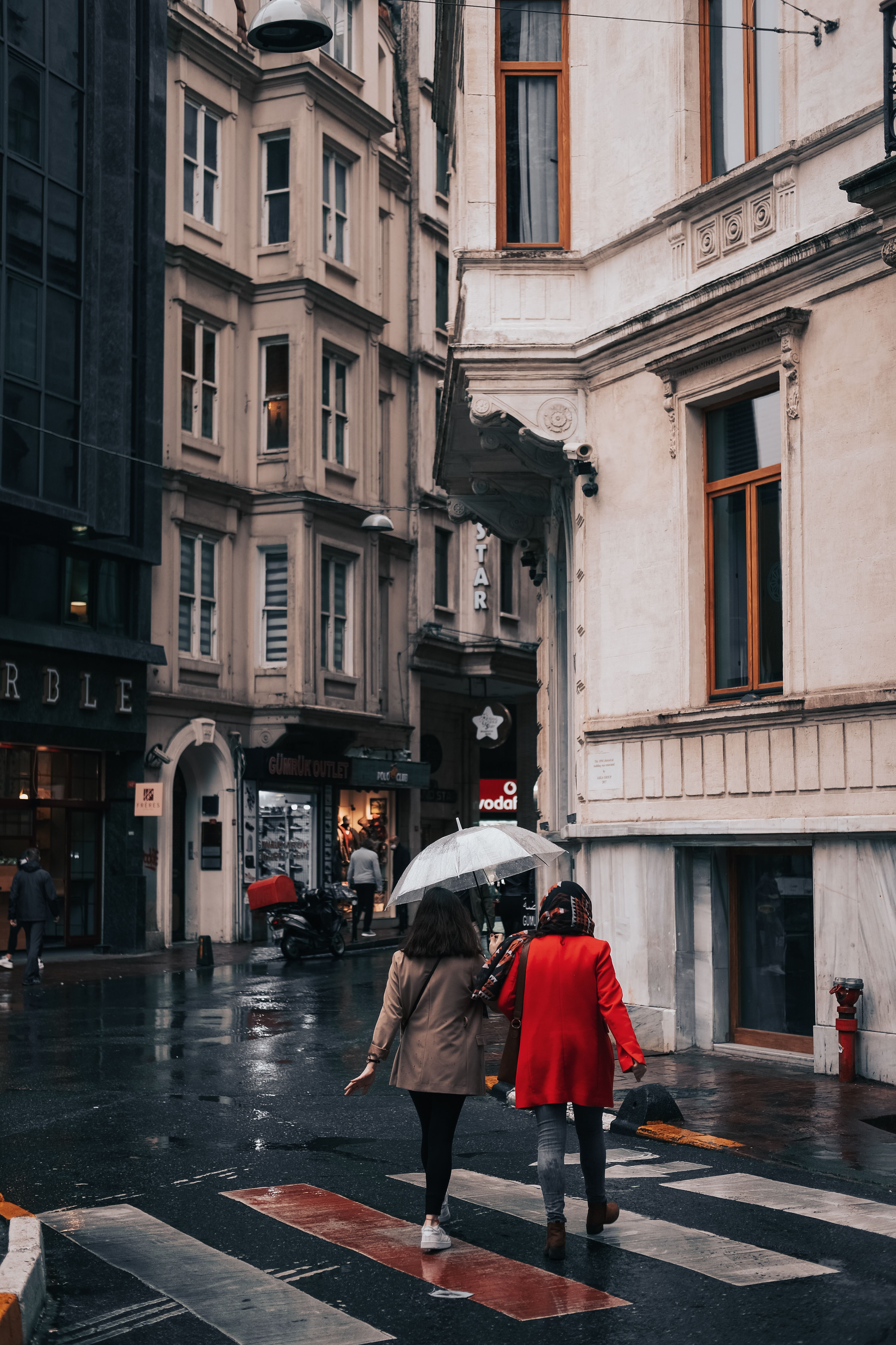 Back View of People Walking Across the Street · Free Stock Photo
