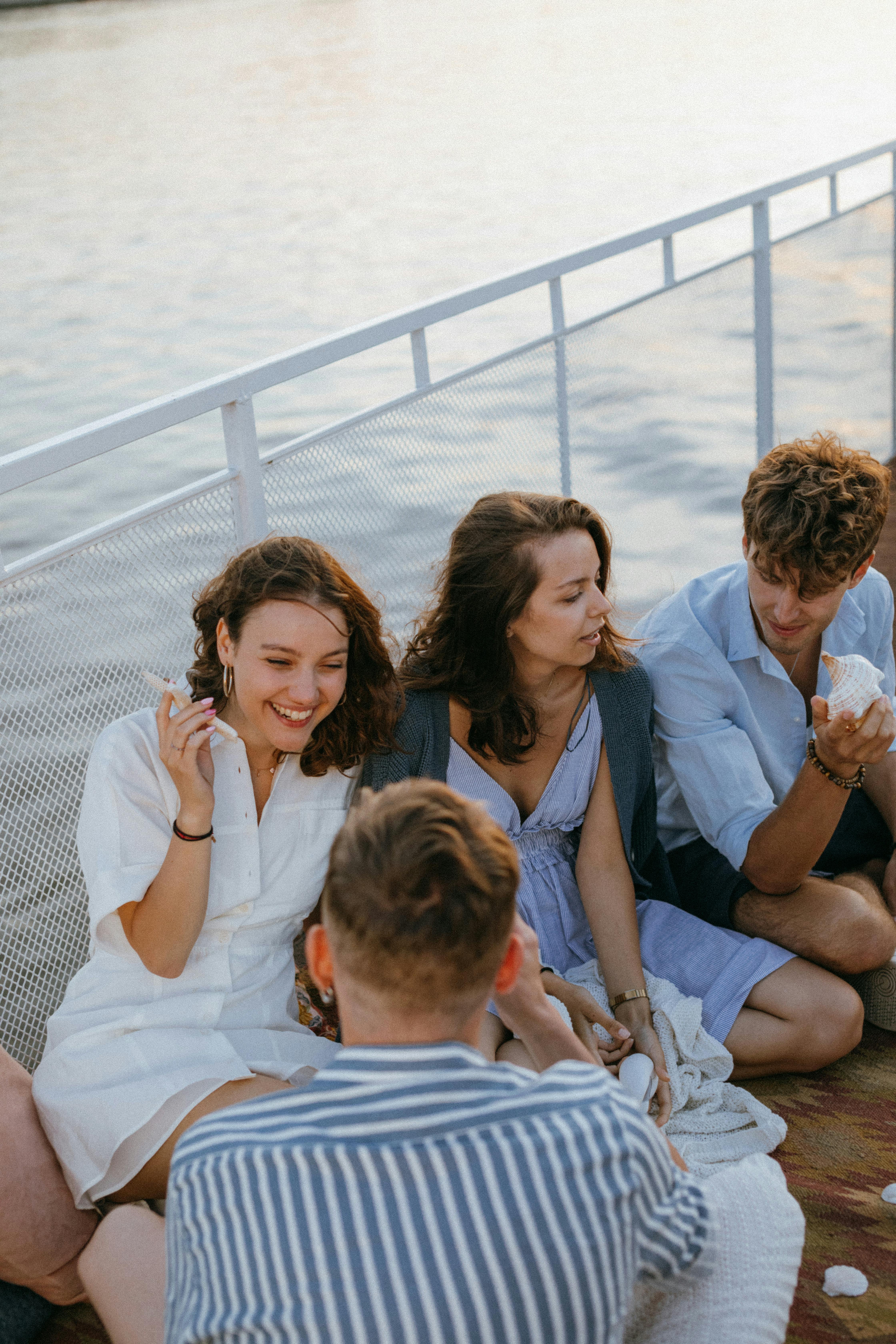 Group of Friends on a Yacht · Free Stock Photo
