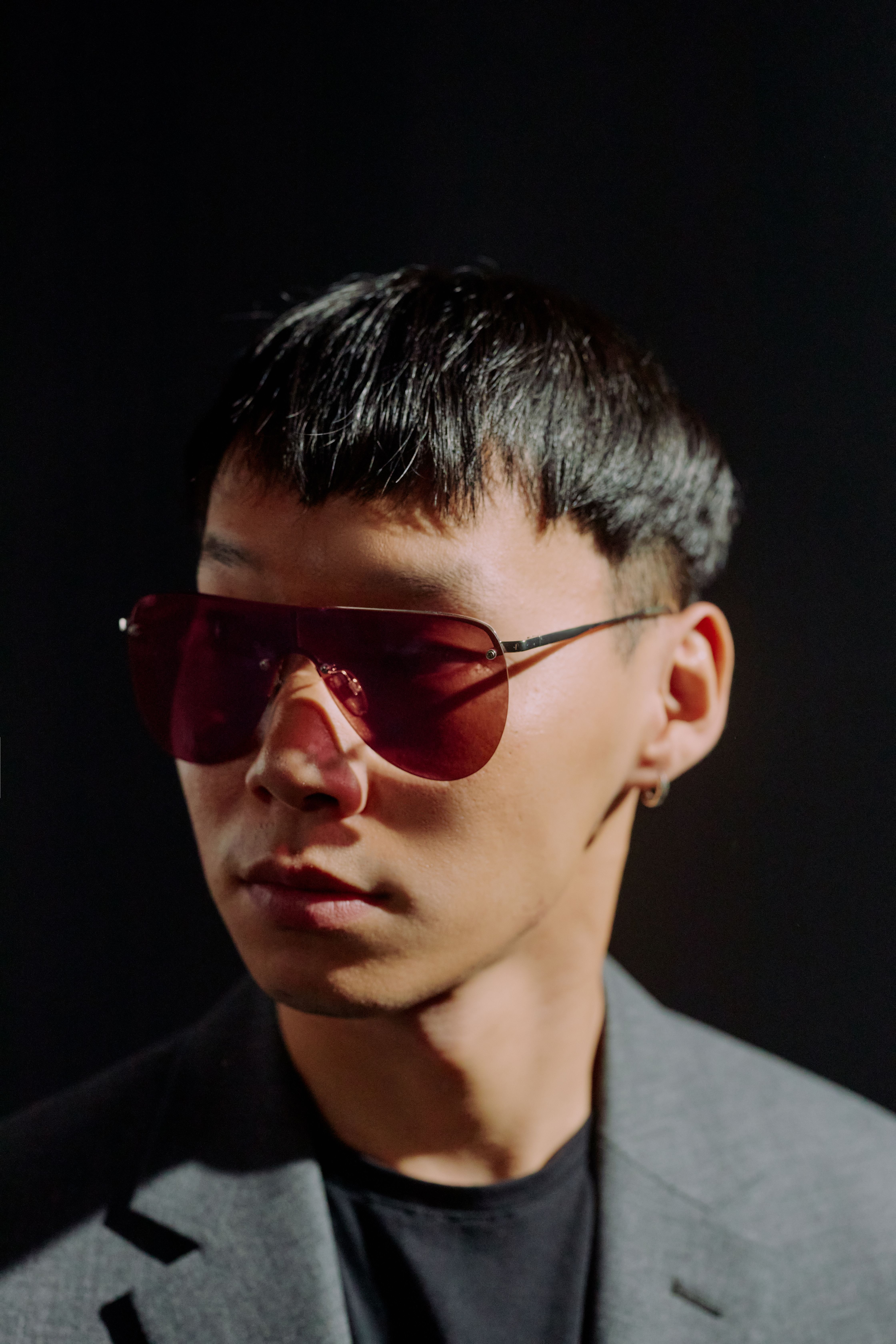 Man in red eyeglasses looking away · Free Stock Photo