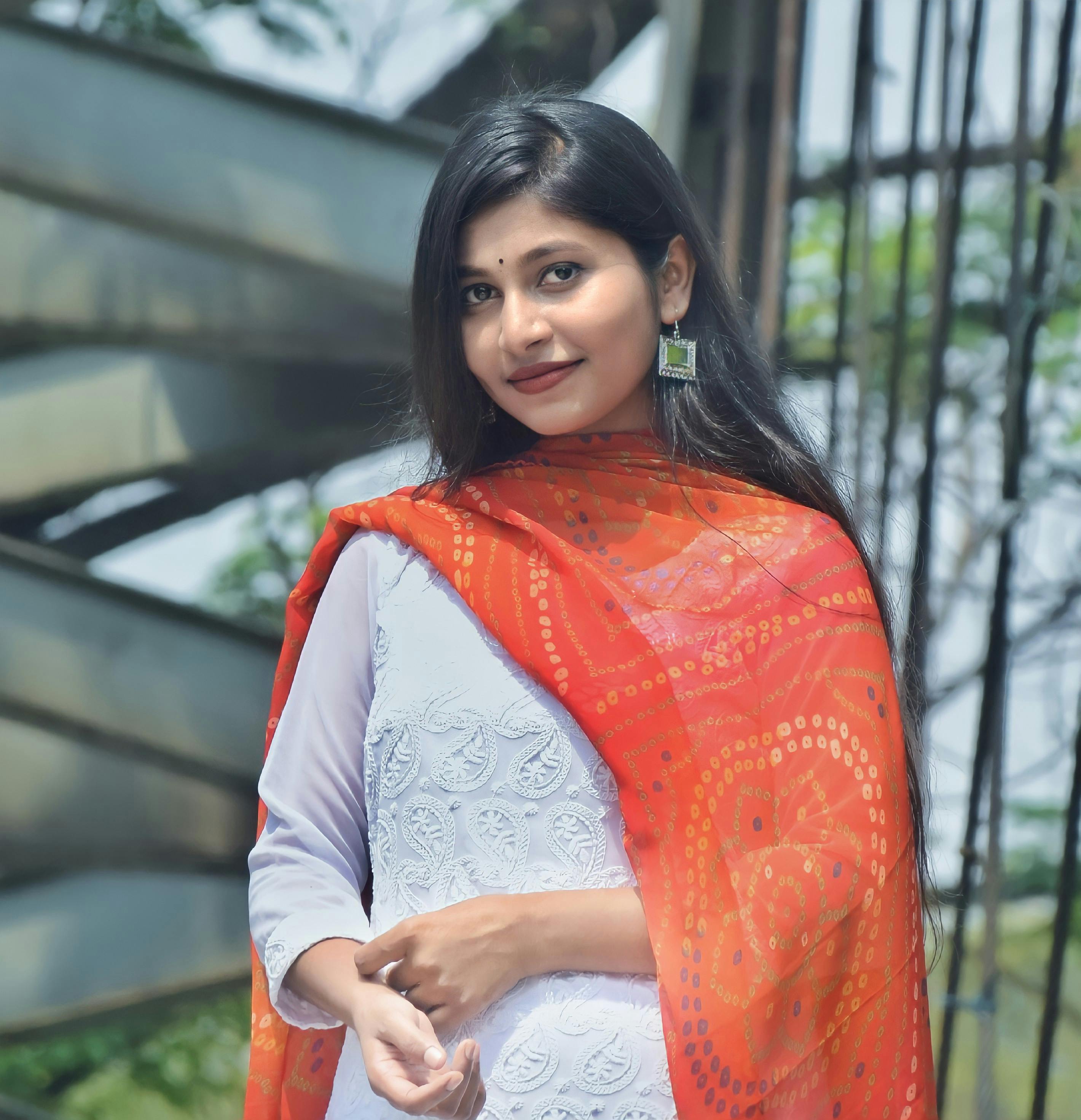 Close-up of a Woman Wearing Red Traditional Clothing · Free Stock Photo
