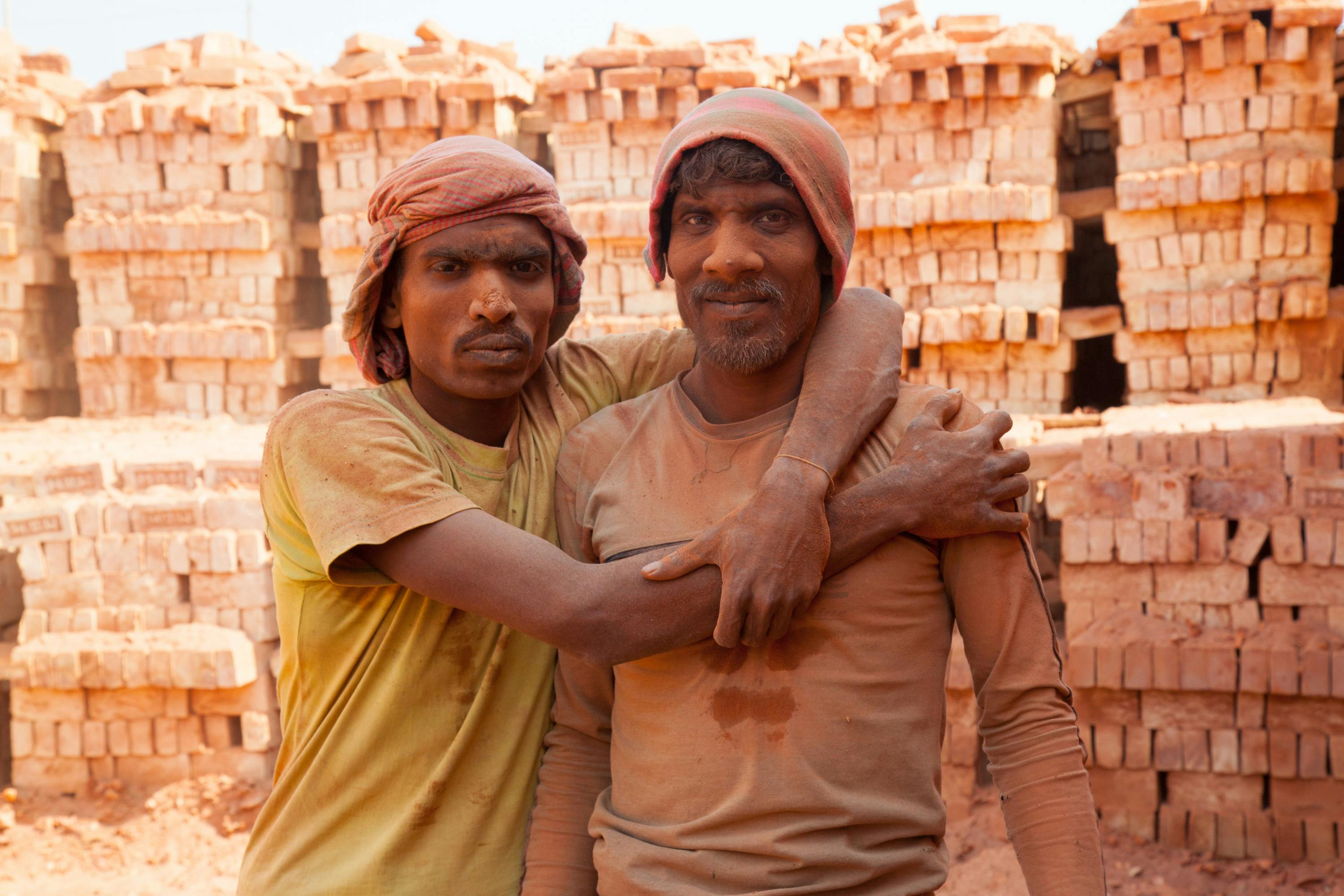 Men Working on Brick Field Outdoors · Free Stock Photo