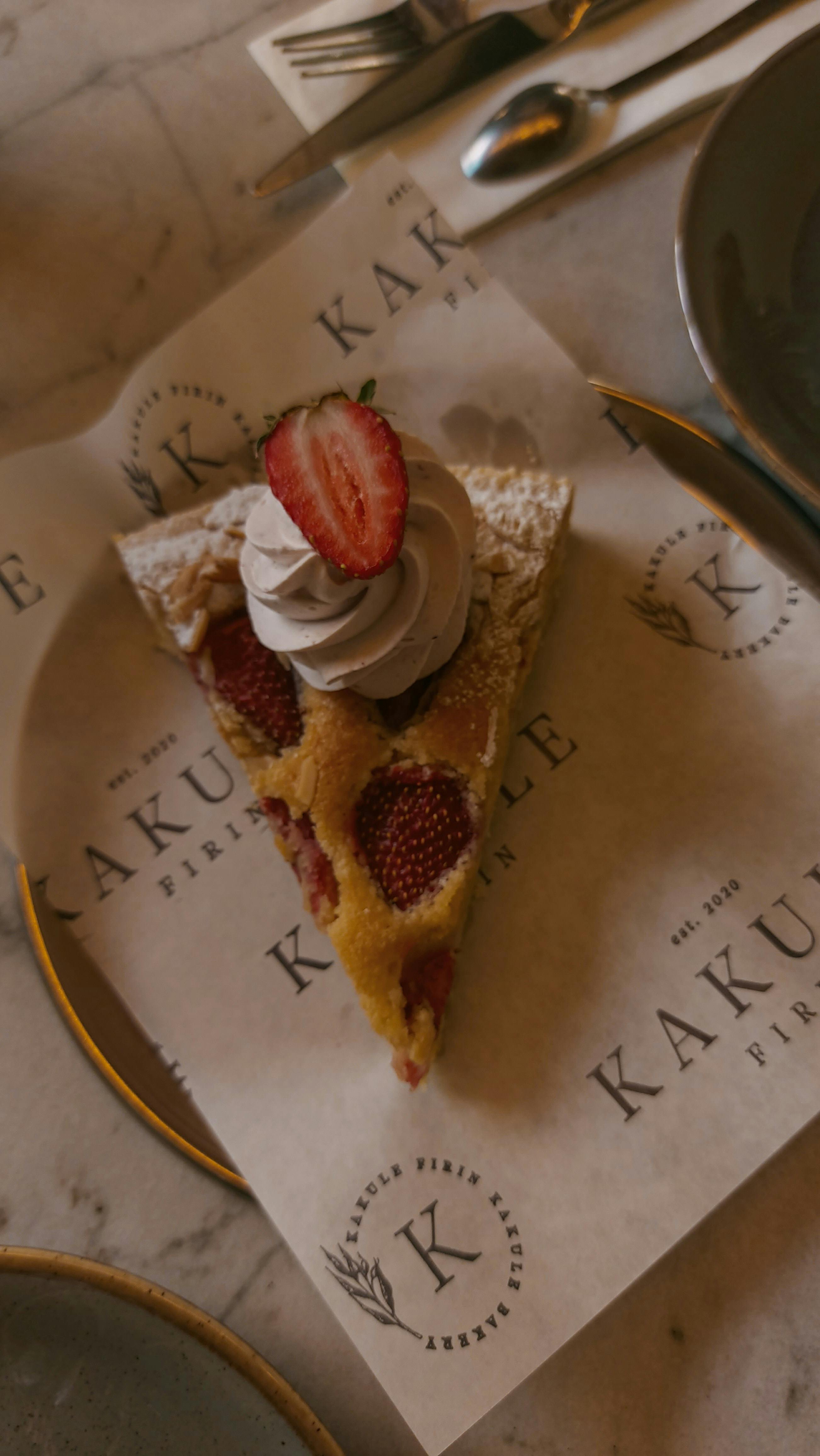 Photo of Sliced Cake on Ceramic Plate · Free Stock Photo
