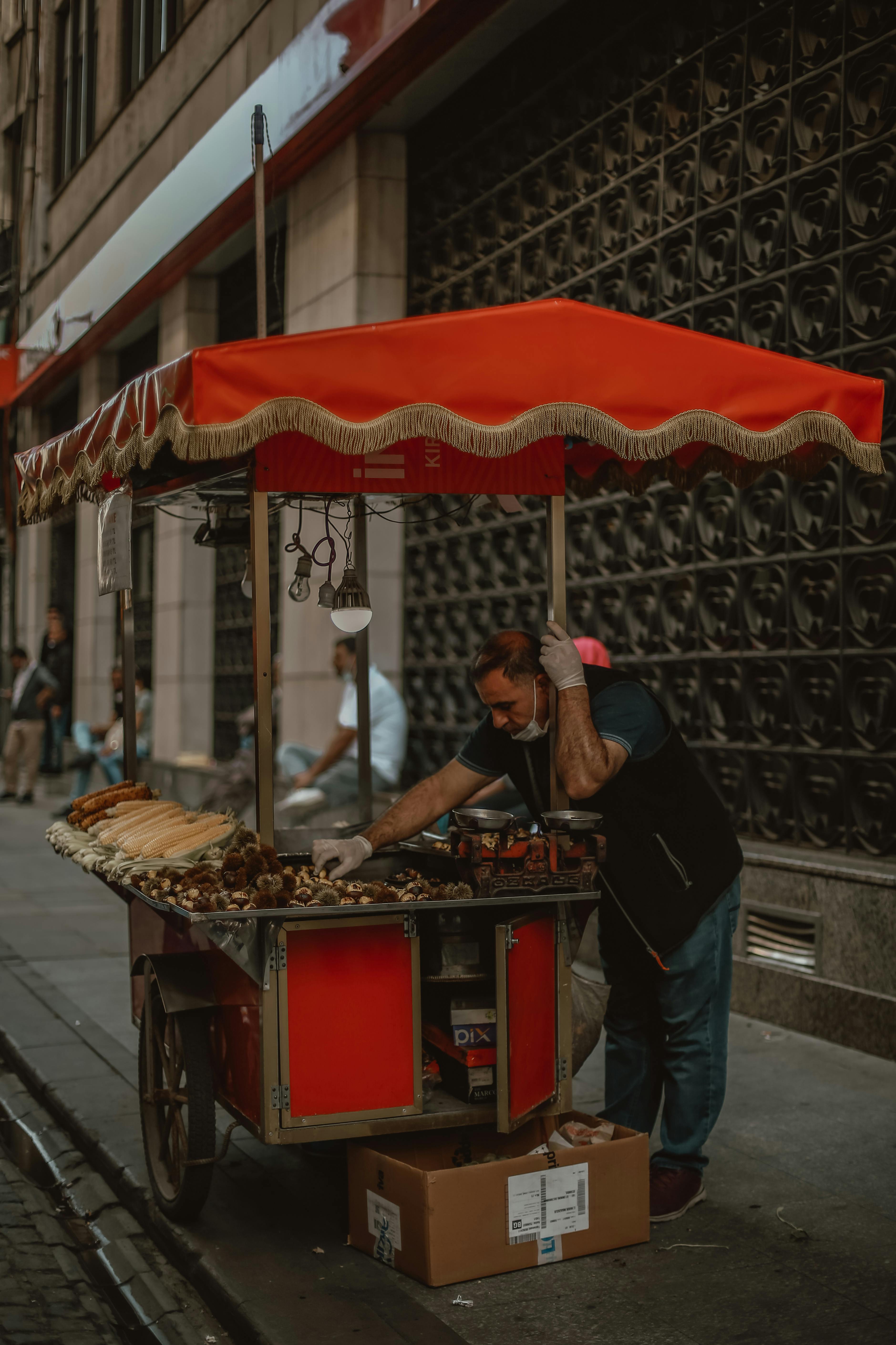 Street Vendor Selling Food · Free Stock Photo