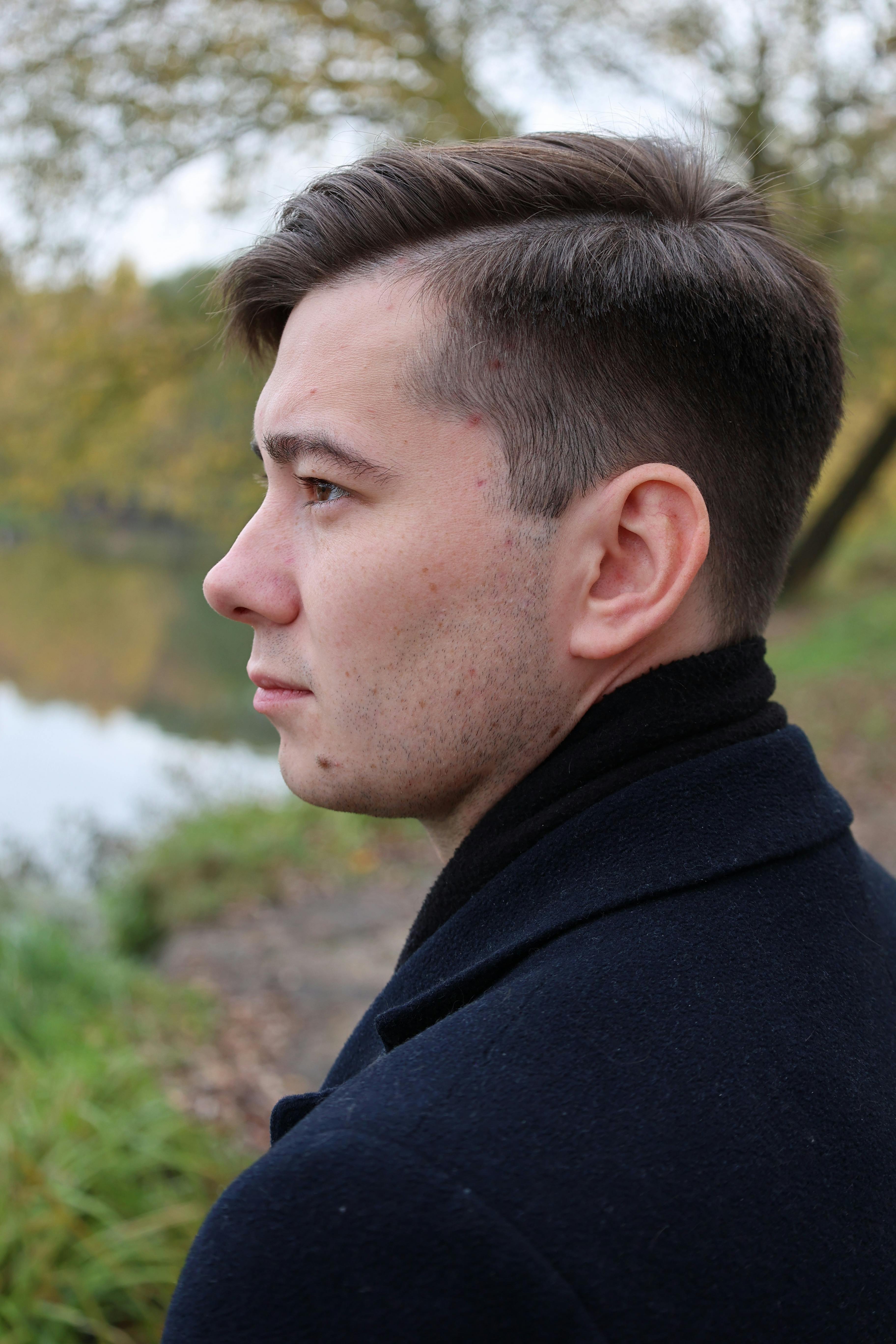 Man in Black Coat Looking Afar · Free Stock Photo