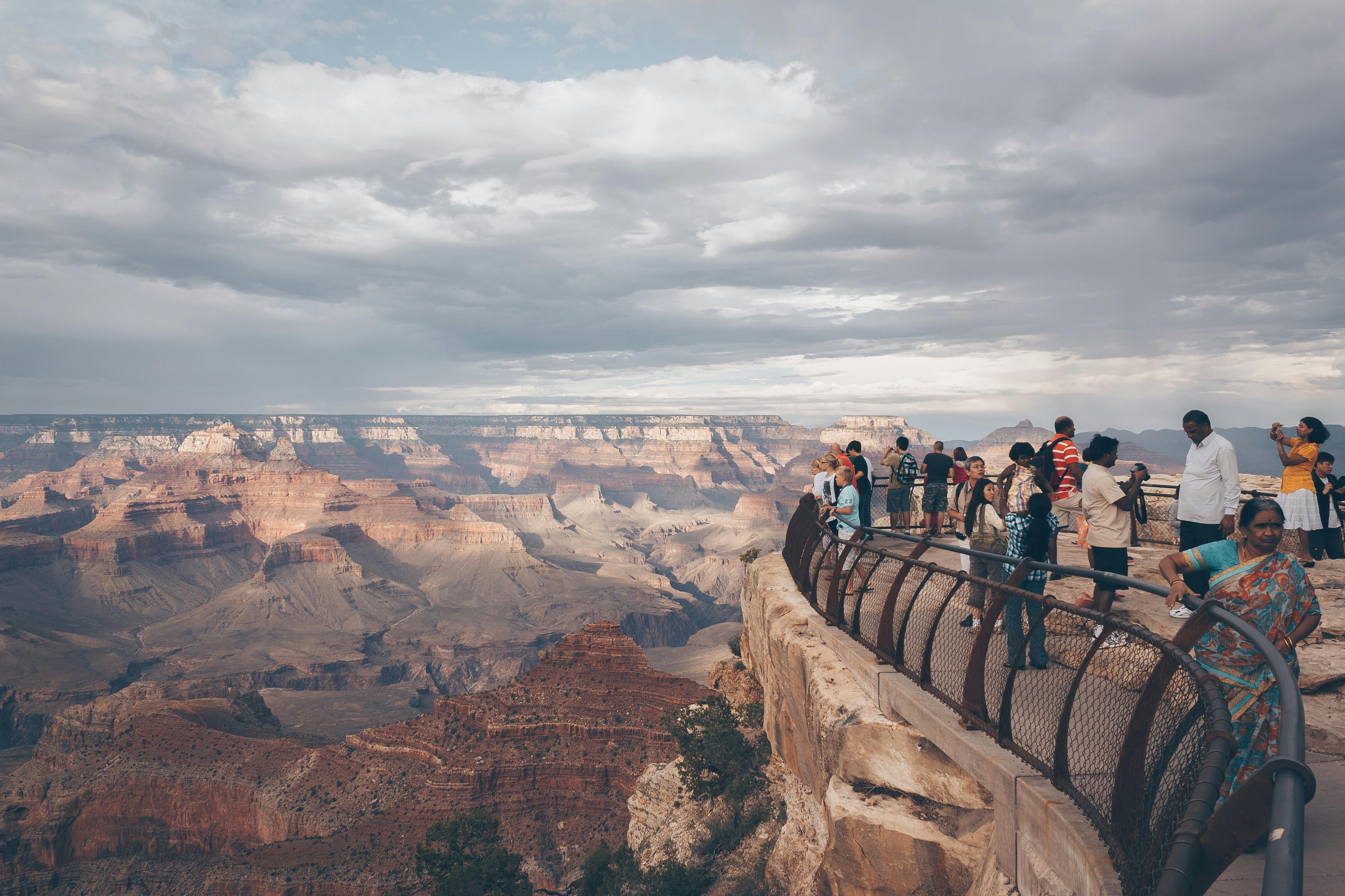 People Watching View from Top of Mountain · Free Stock Photo