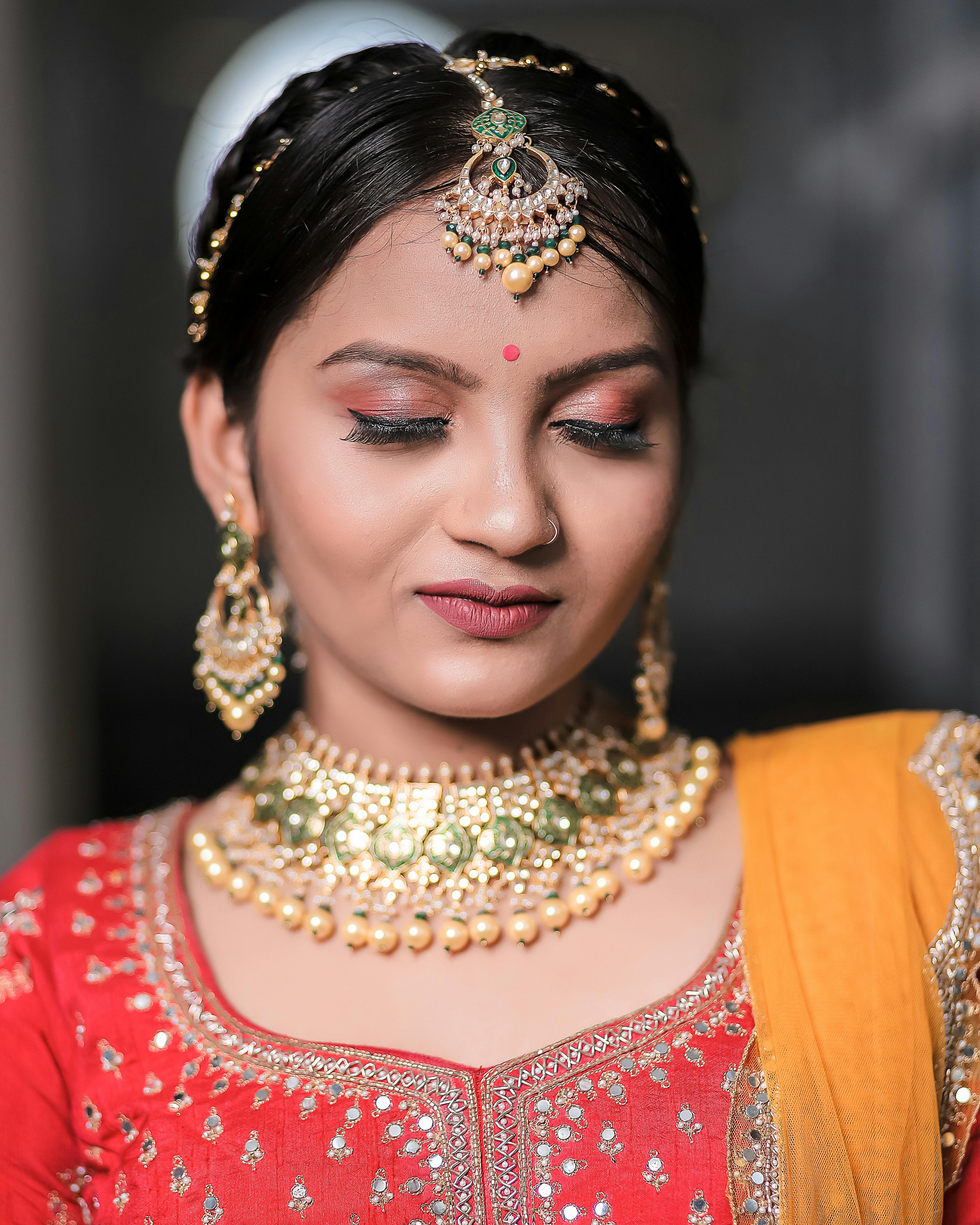 Shallow Focus Photography Of Woman Wearing Blue And Gold Dress · Free