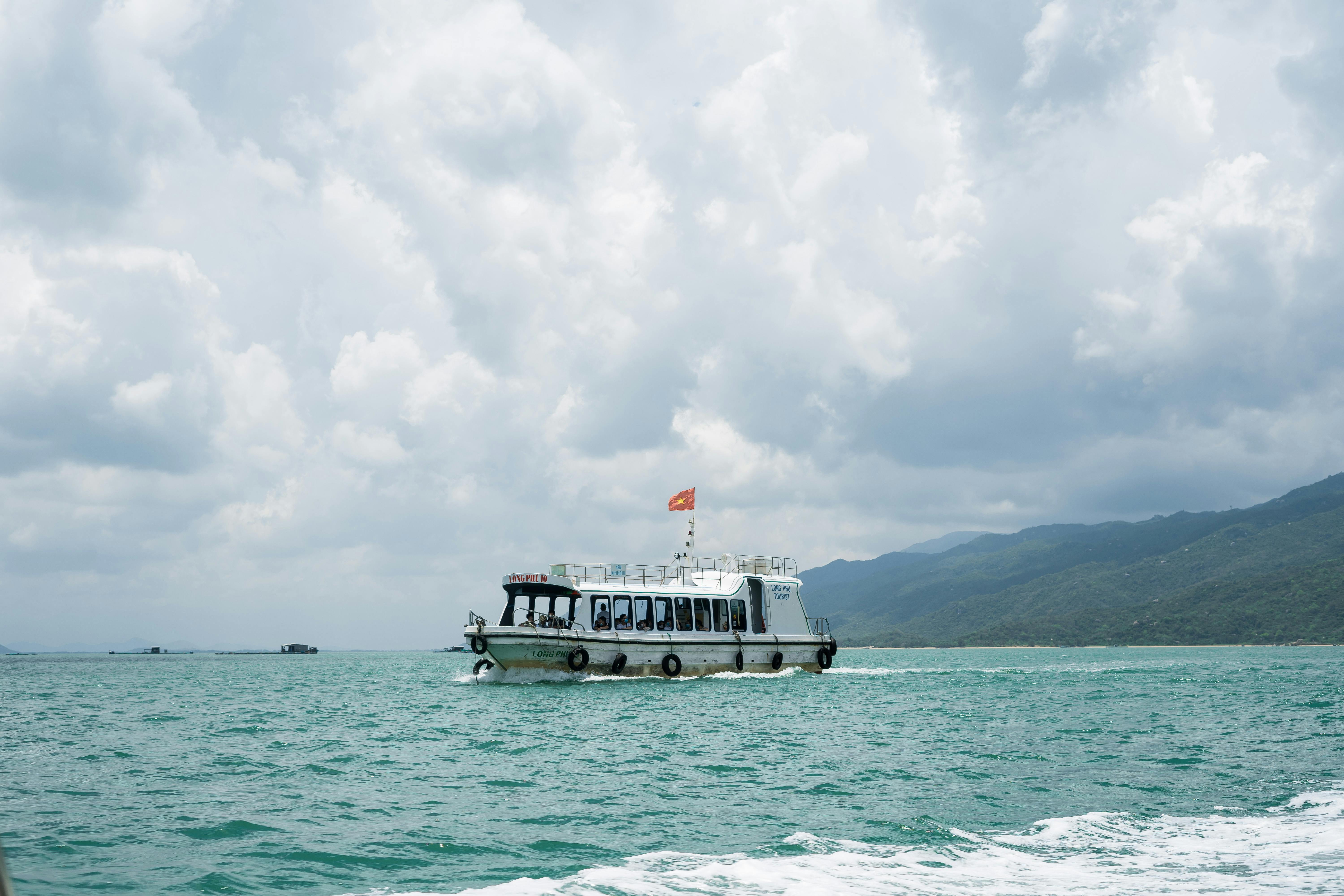 Ferry on Body of Water · Free Stock Photo