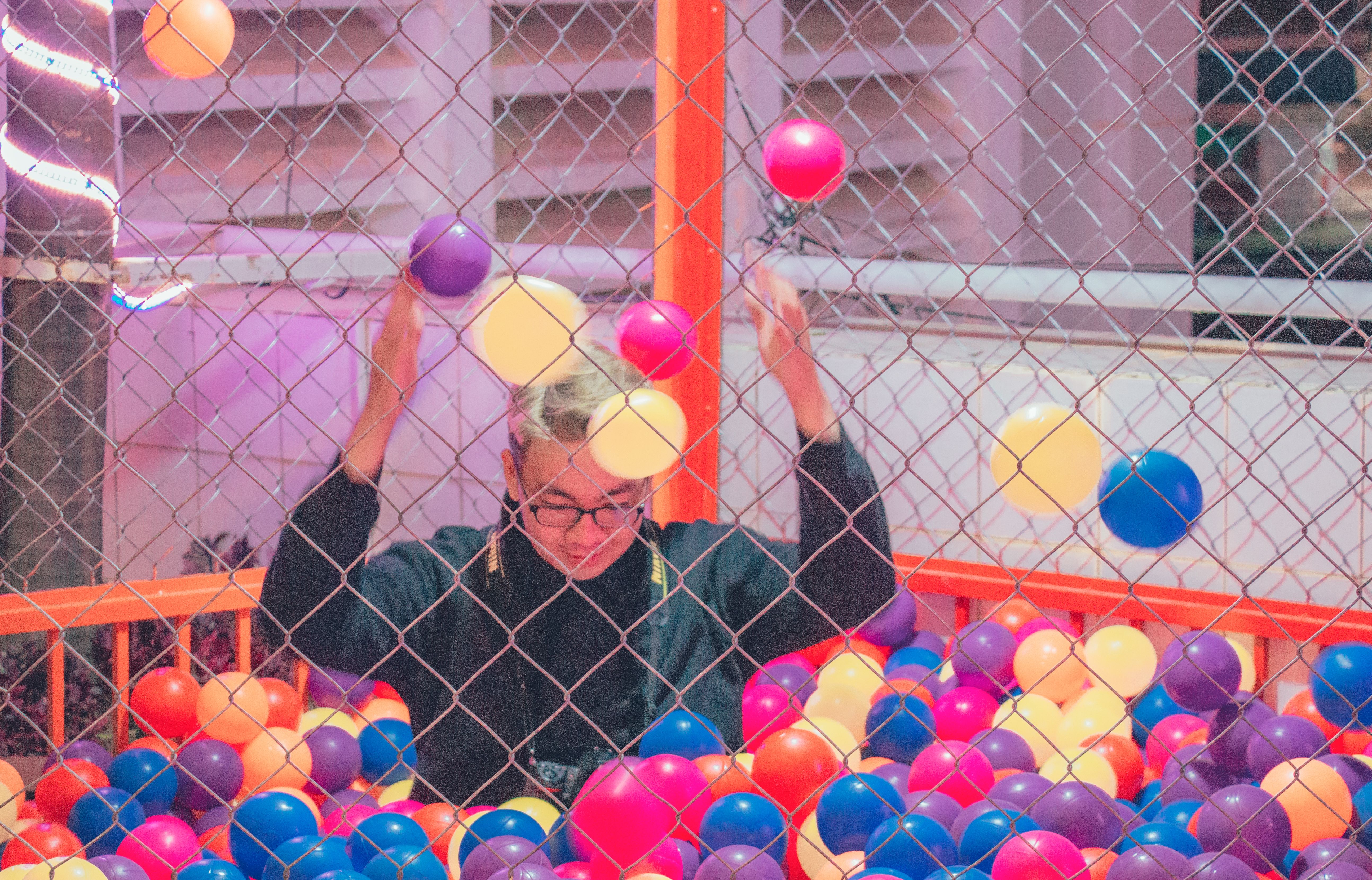Man in Ball Pit · Free Stock Photo