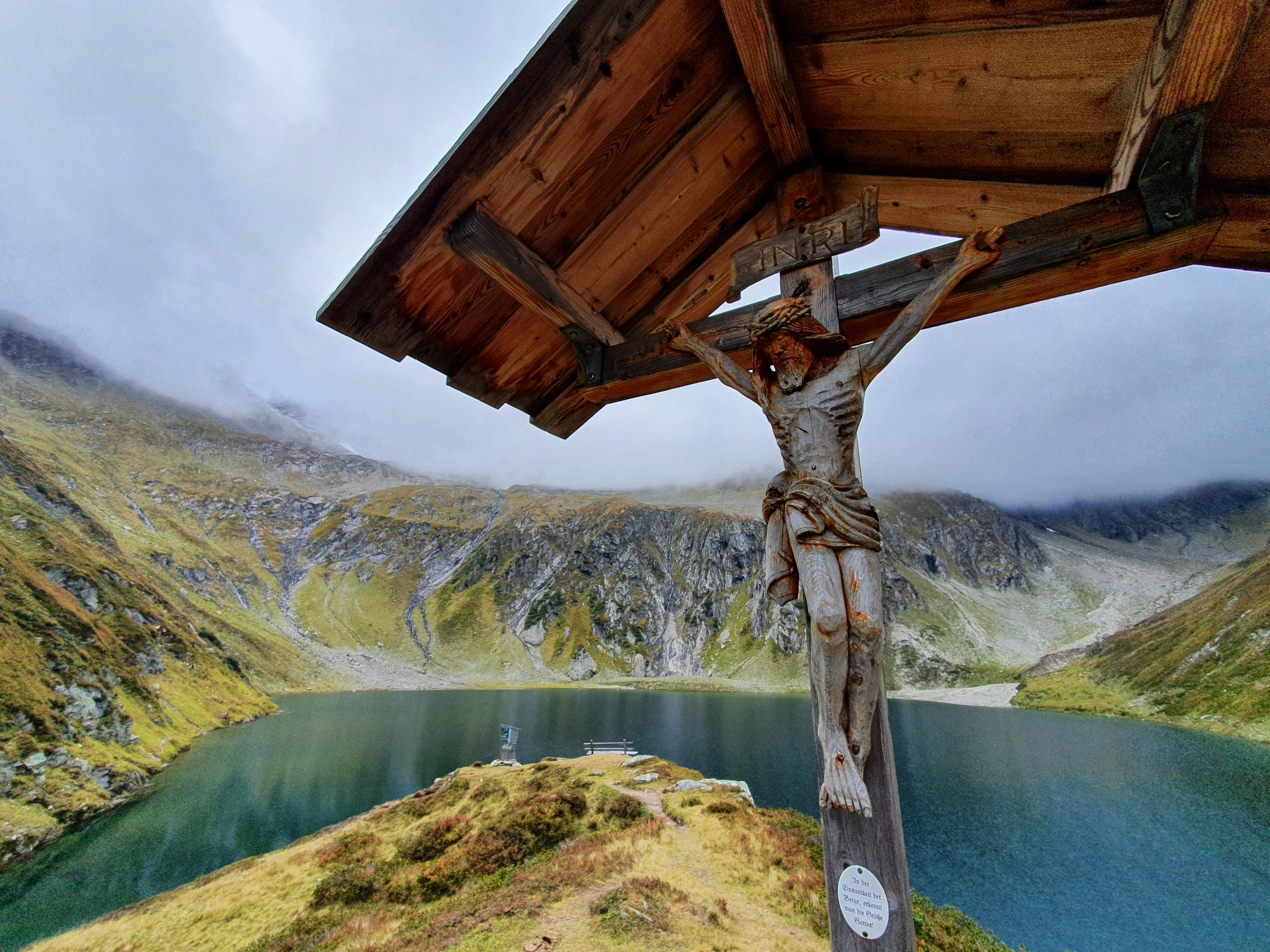 Wooden Crucifix Near a Lake · Free Stock Photo