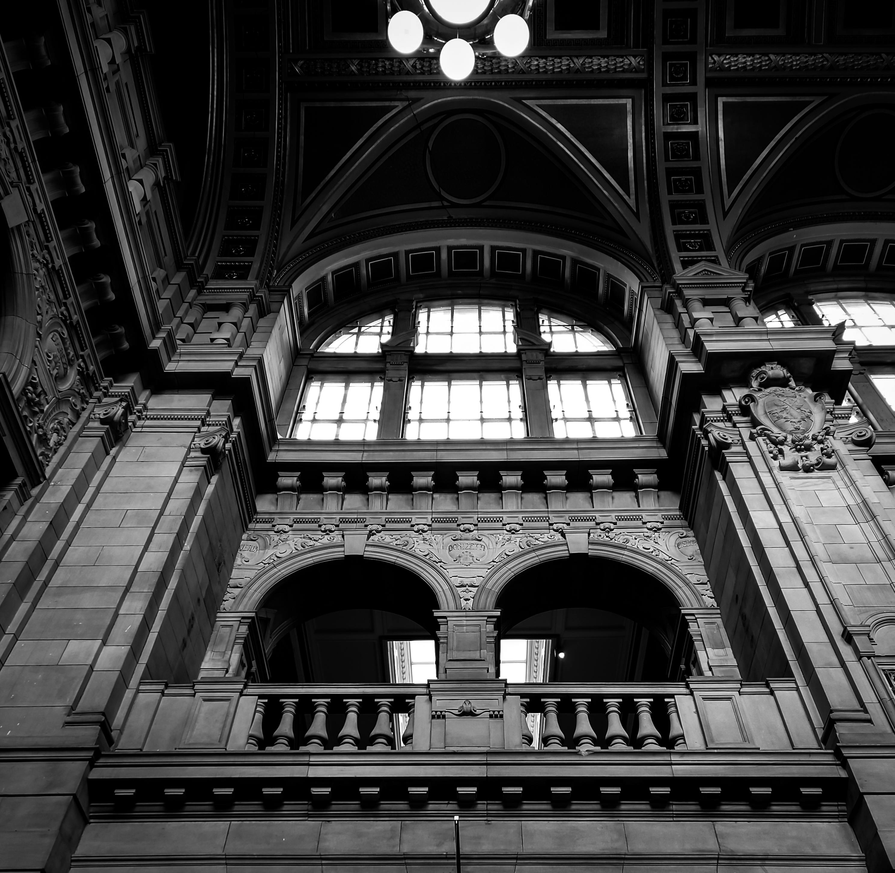 Grayscale Photo of Building Interior · Free Stock Photo