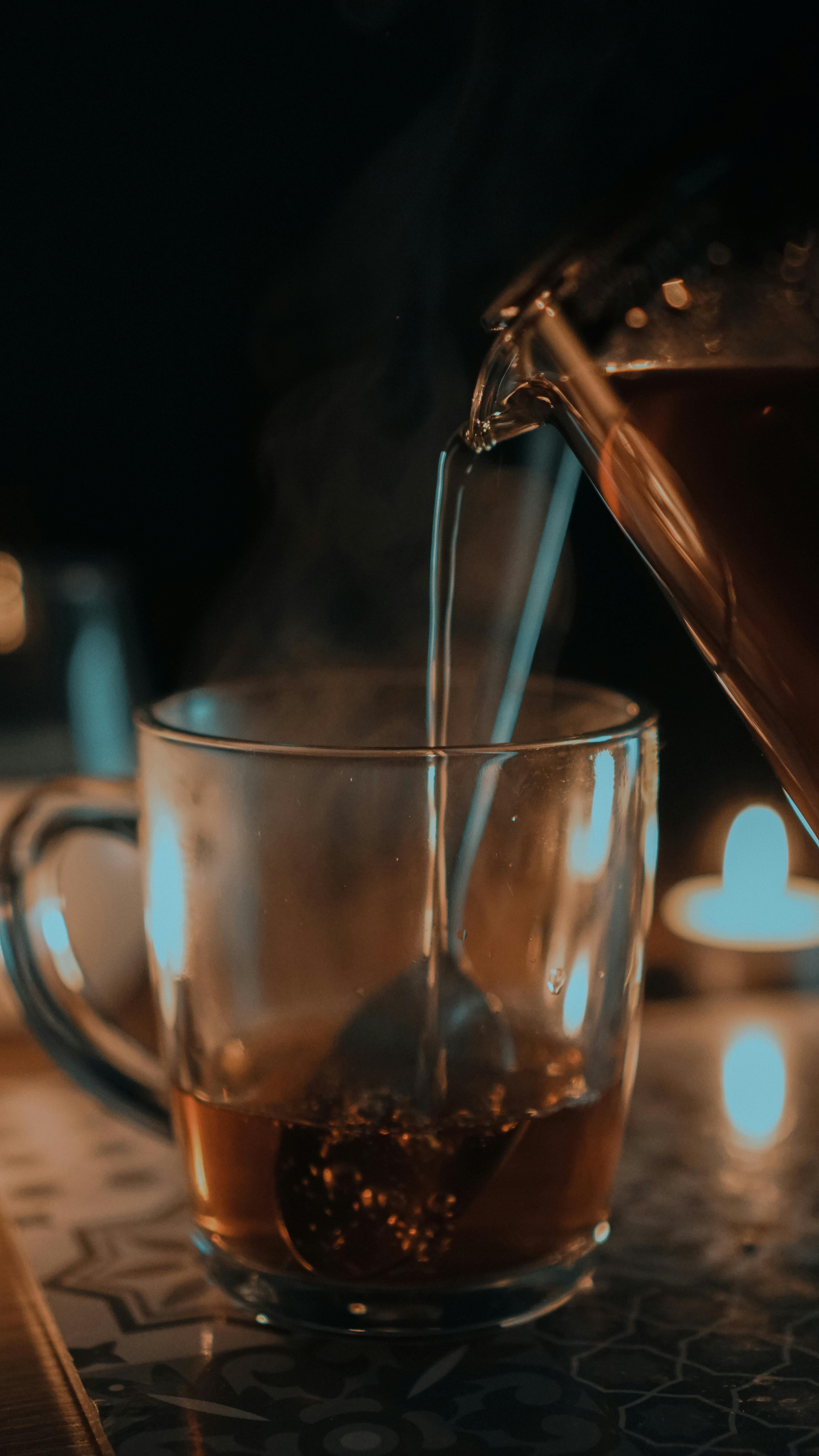 Spon on Coffee Cup · Free Stock Photo