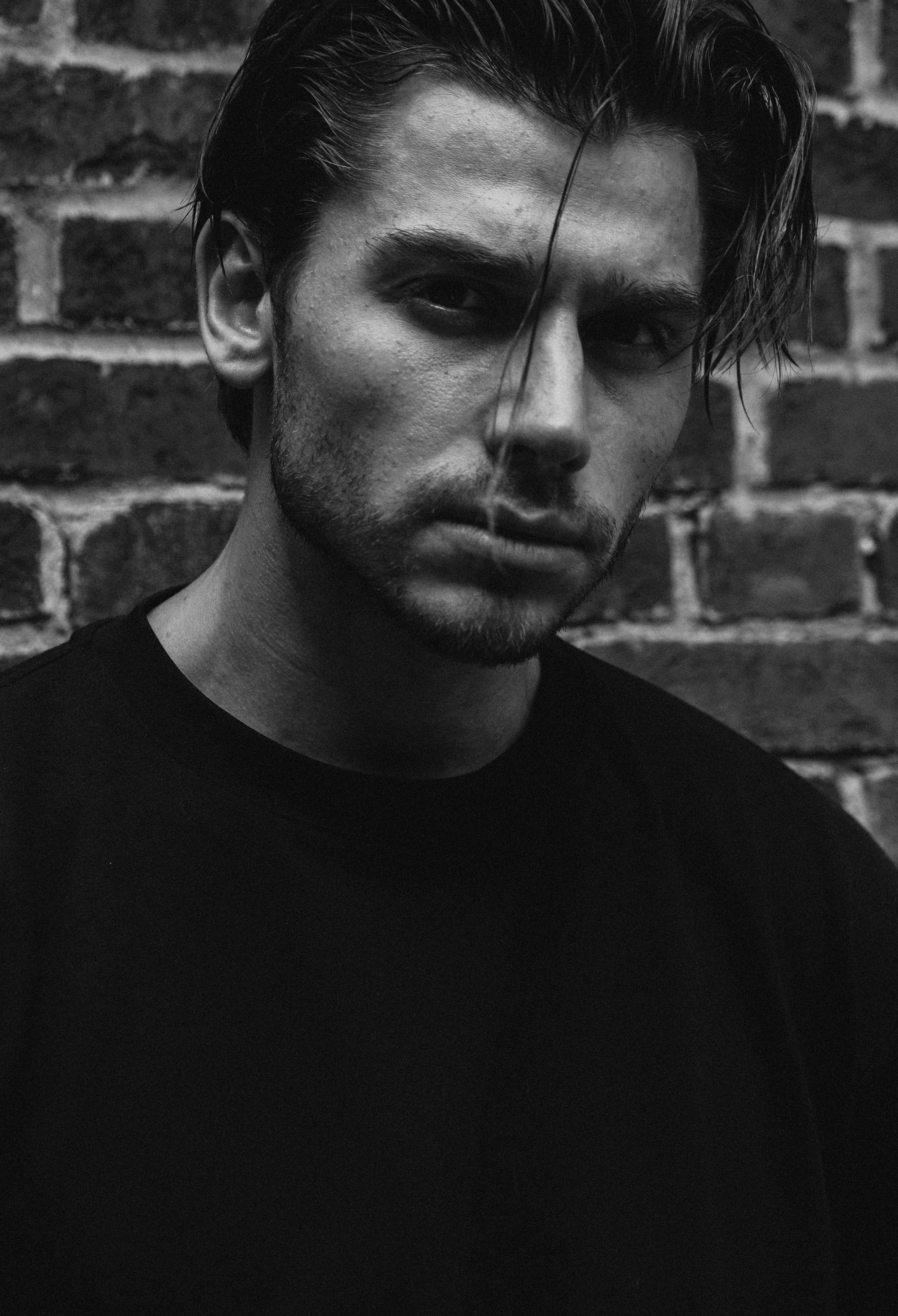 Portrait of Man Wearing Shell Choker Necklace · Free Stock Photo