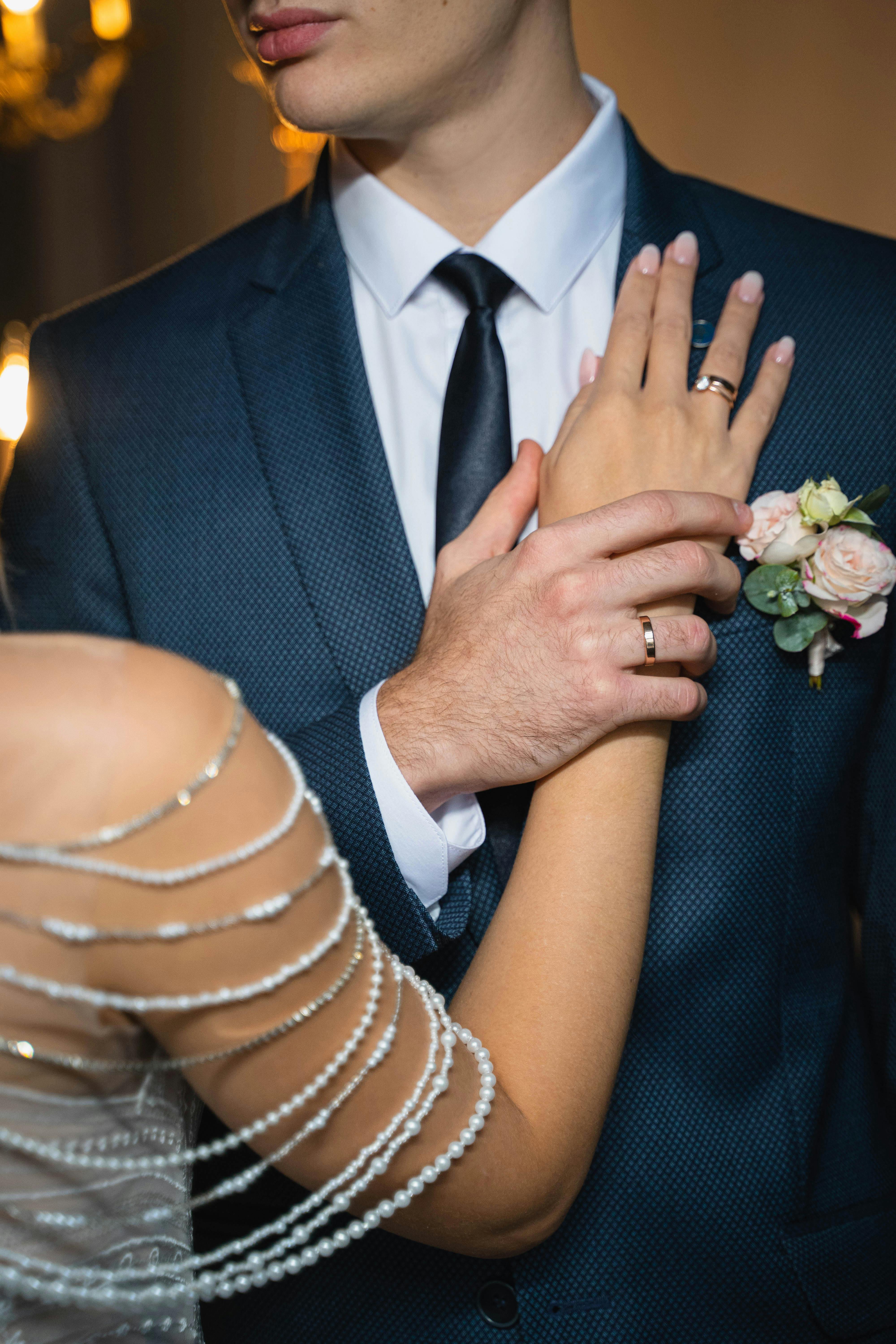 Newlywed Couple Wearing Their Wedding Rings · Free Stock Photo