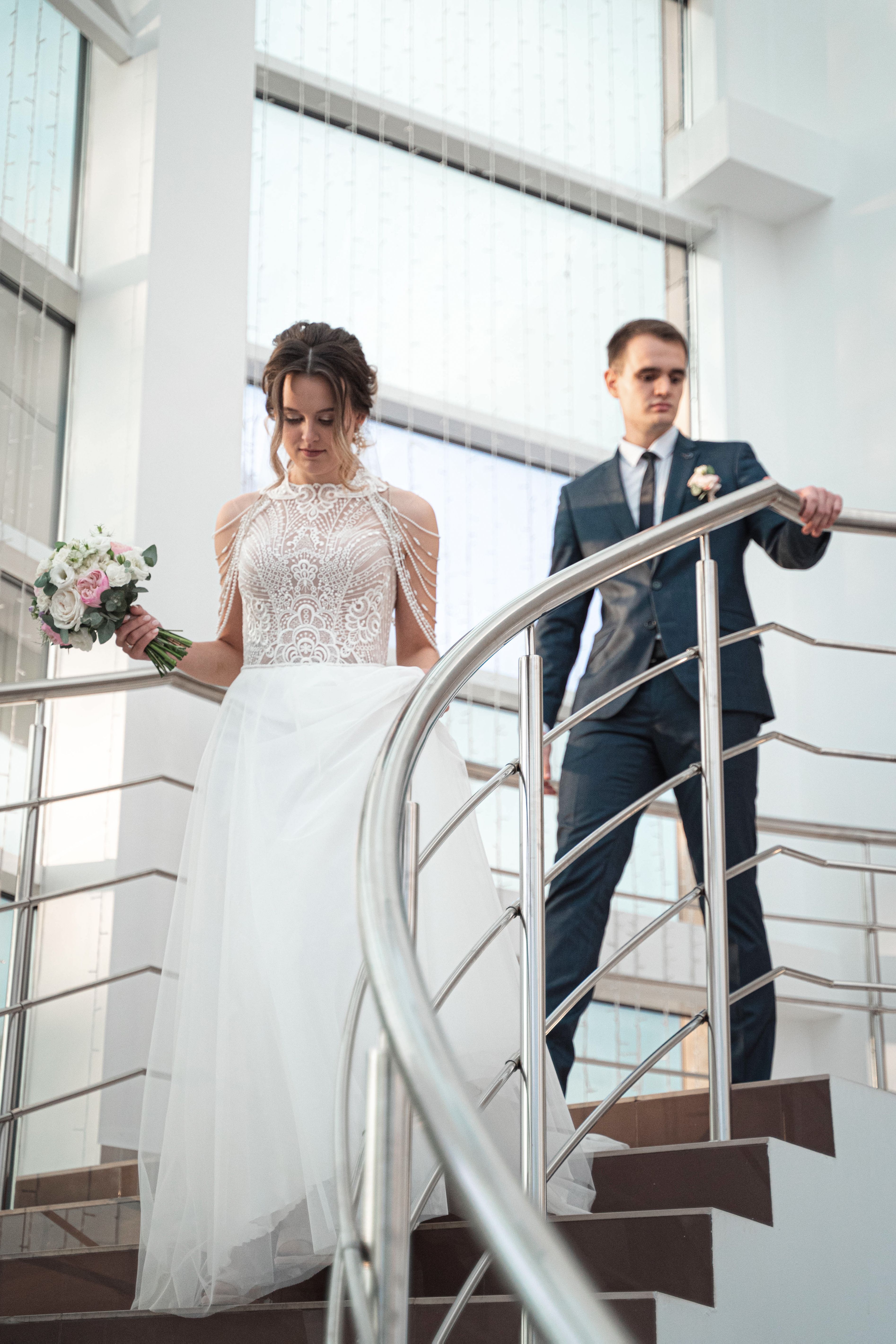 Bride and Groom Going Down the Stairs · Free Stock Photo