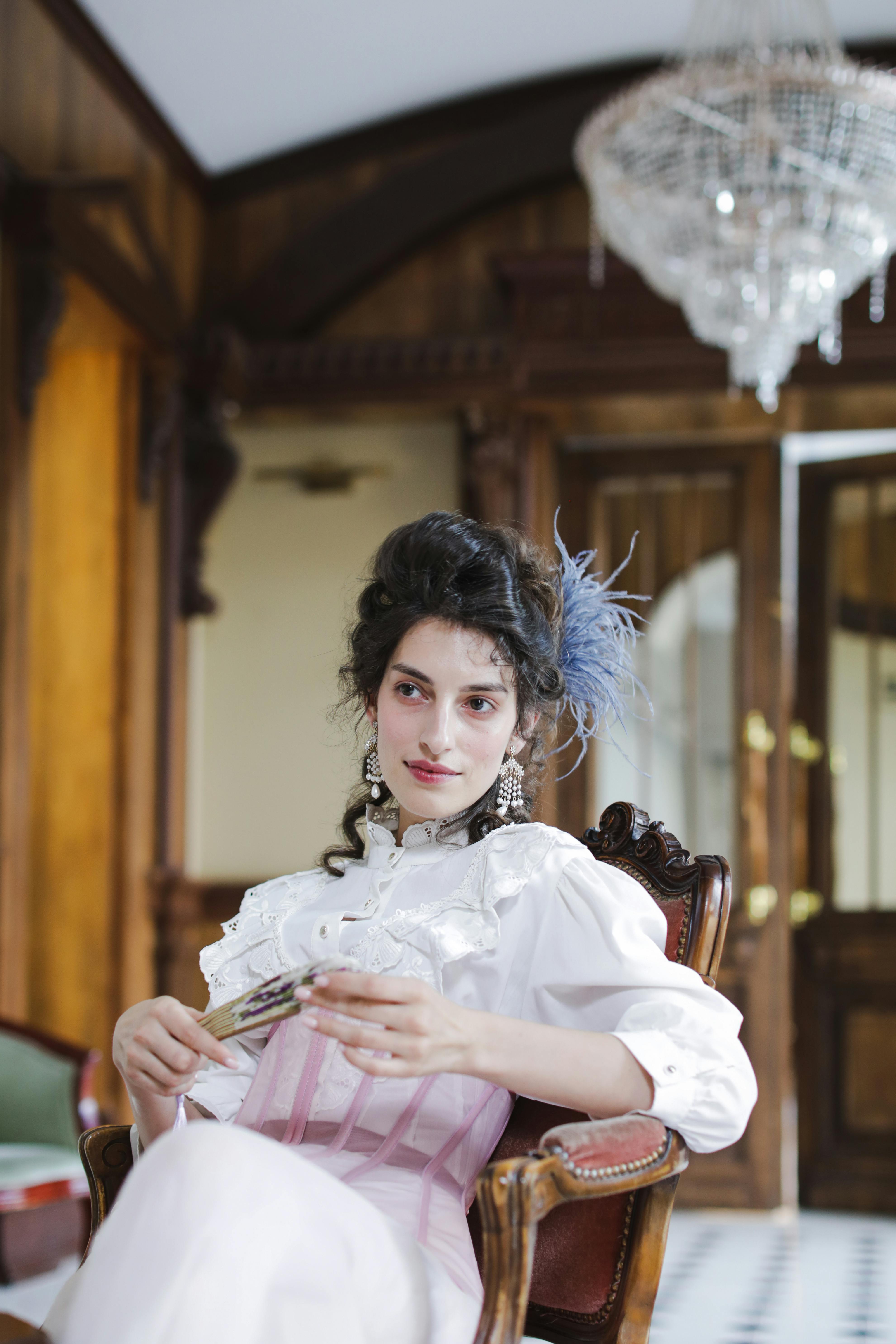 Women Reflection on a Wall Mirror · Free Stock Photo