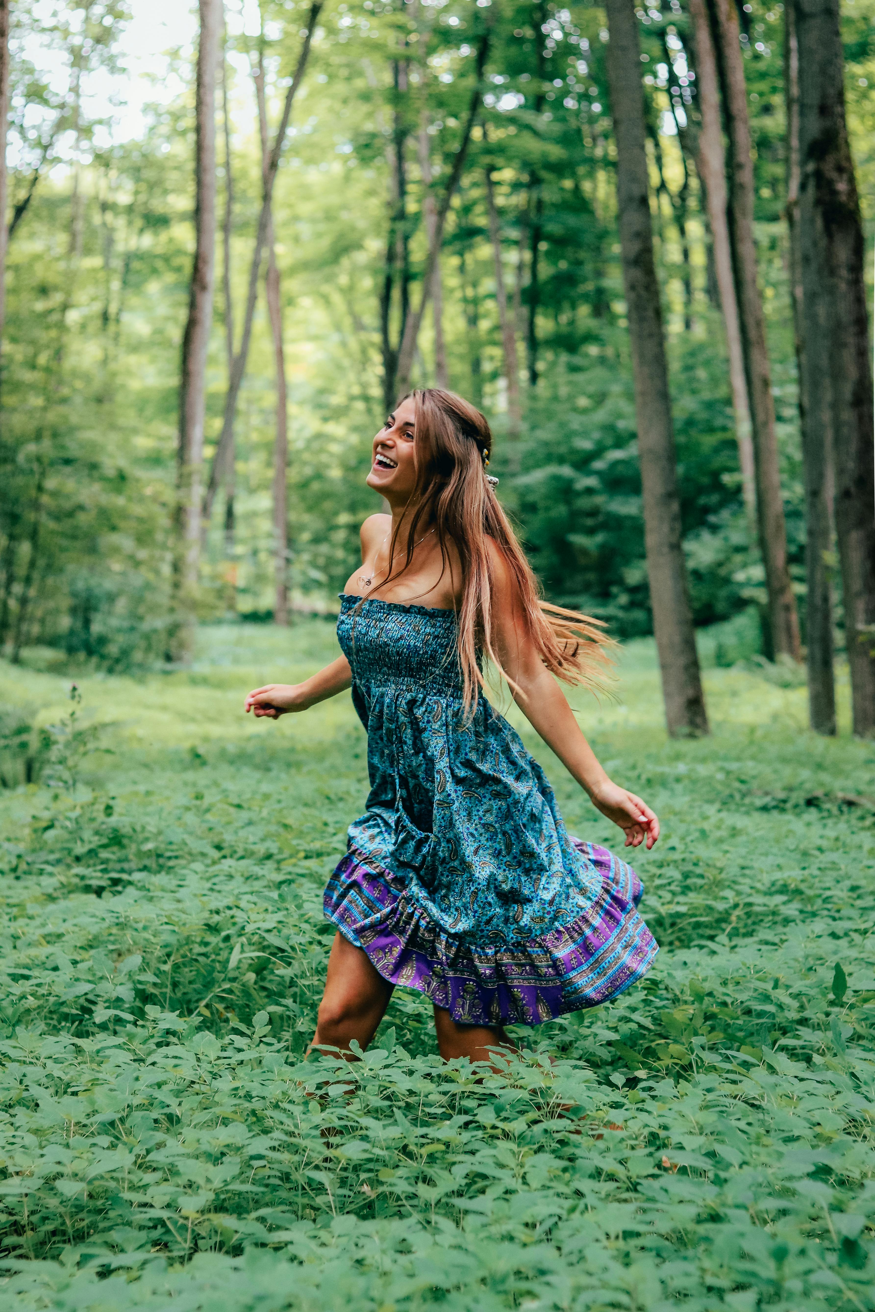 A Woman in a Dancing in the Forest · Free Stock Photo