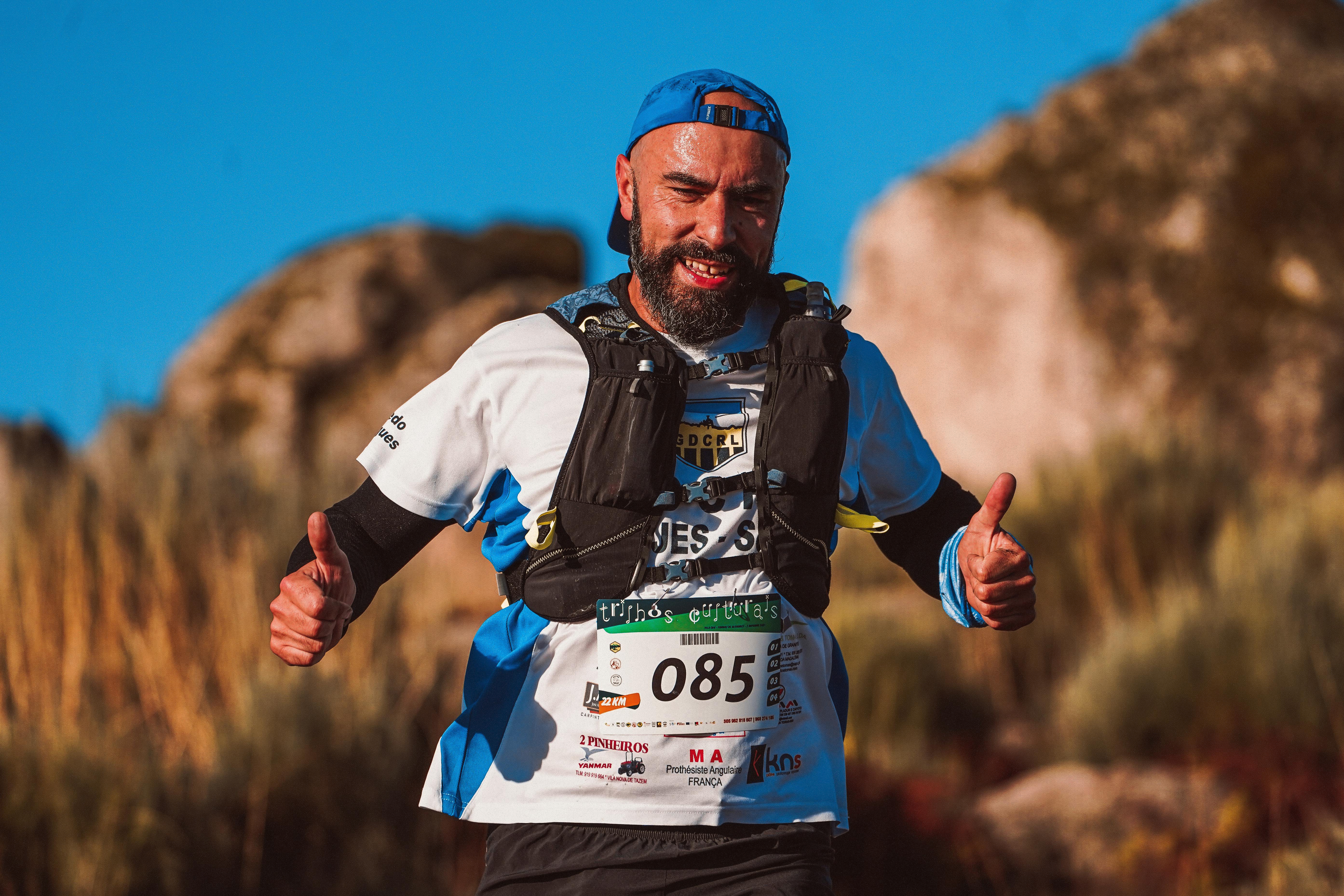 Smiling Sportsman with Backpack · Free Stock Photo