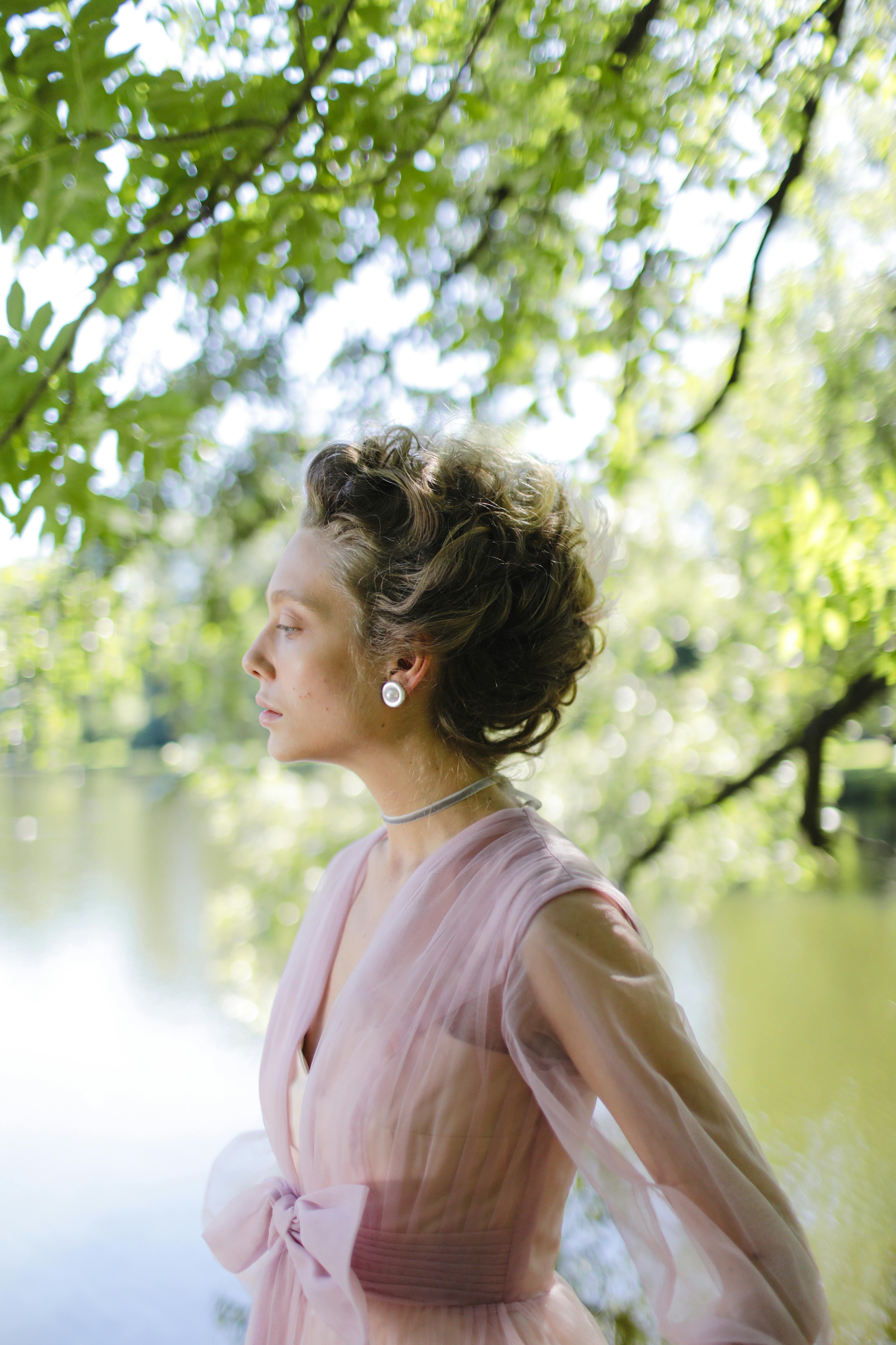 Side View of a Lady in Pink Dress · Free Stock Photo
