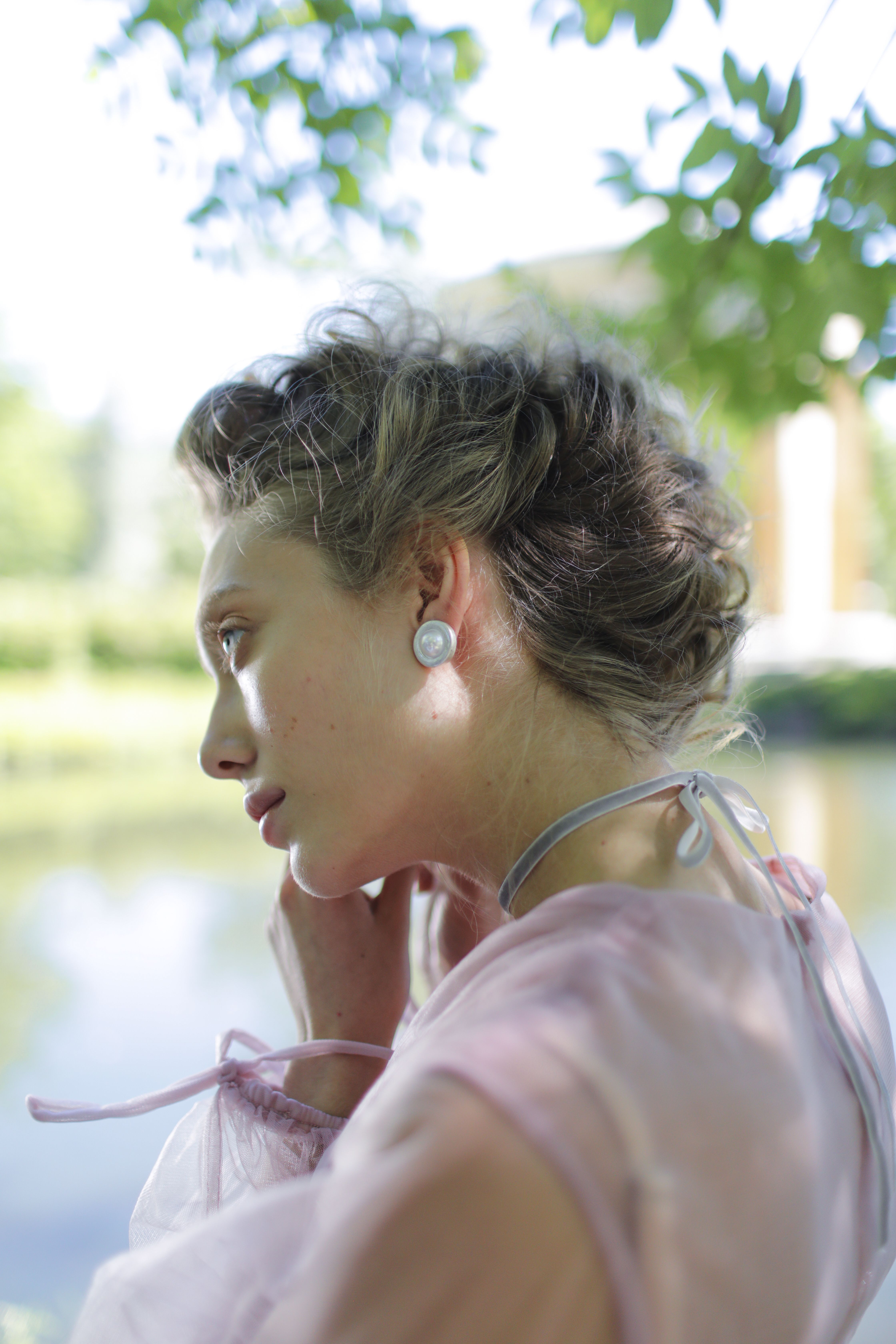 Side Profile of a Lady Wearing an Earring · Free Stock Photo