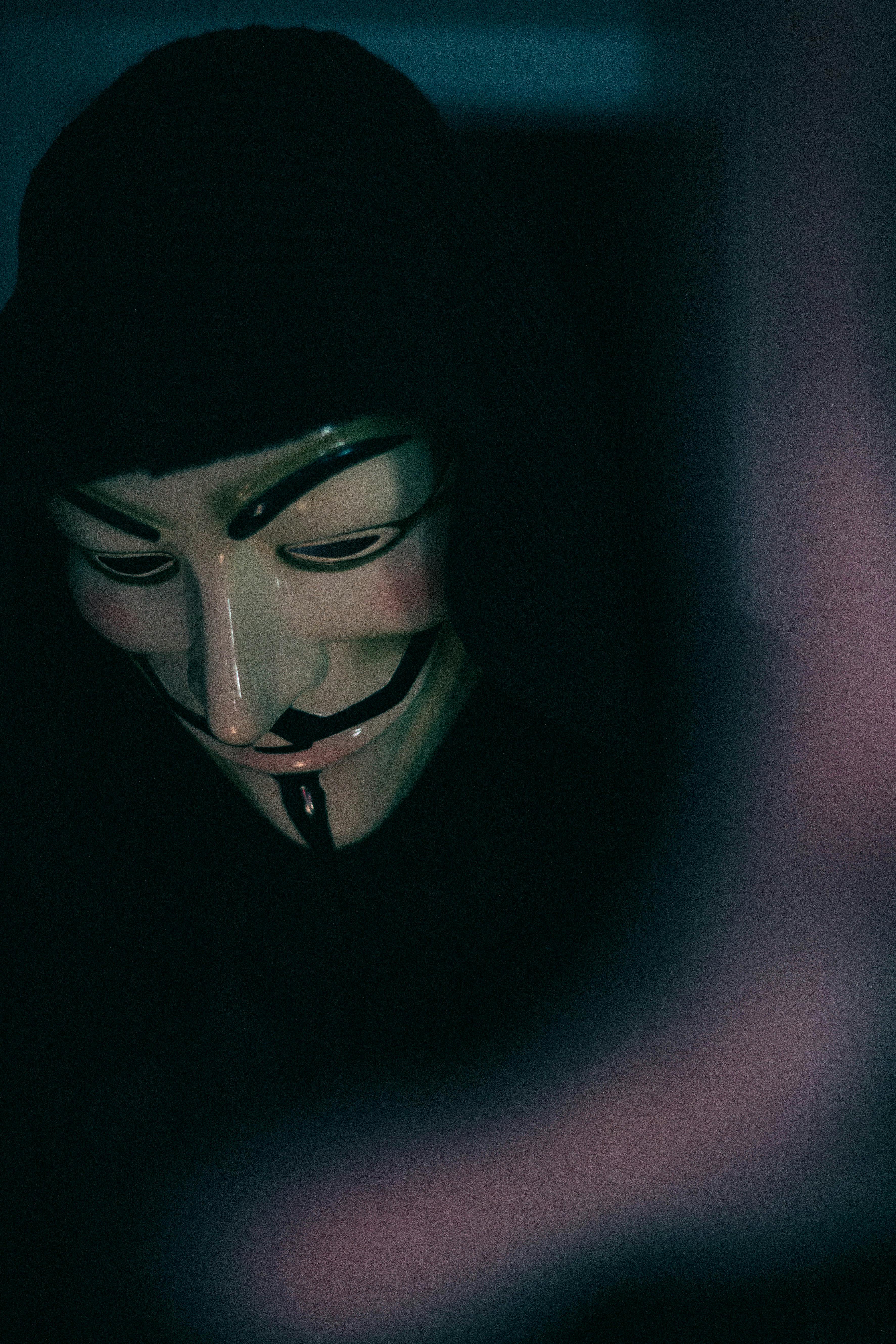 Person in Mask and Hood · Free Stock Photo