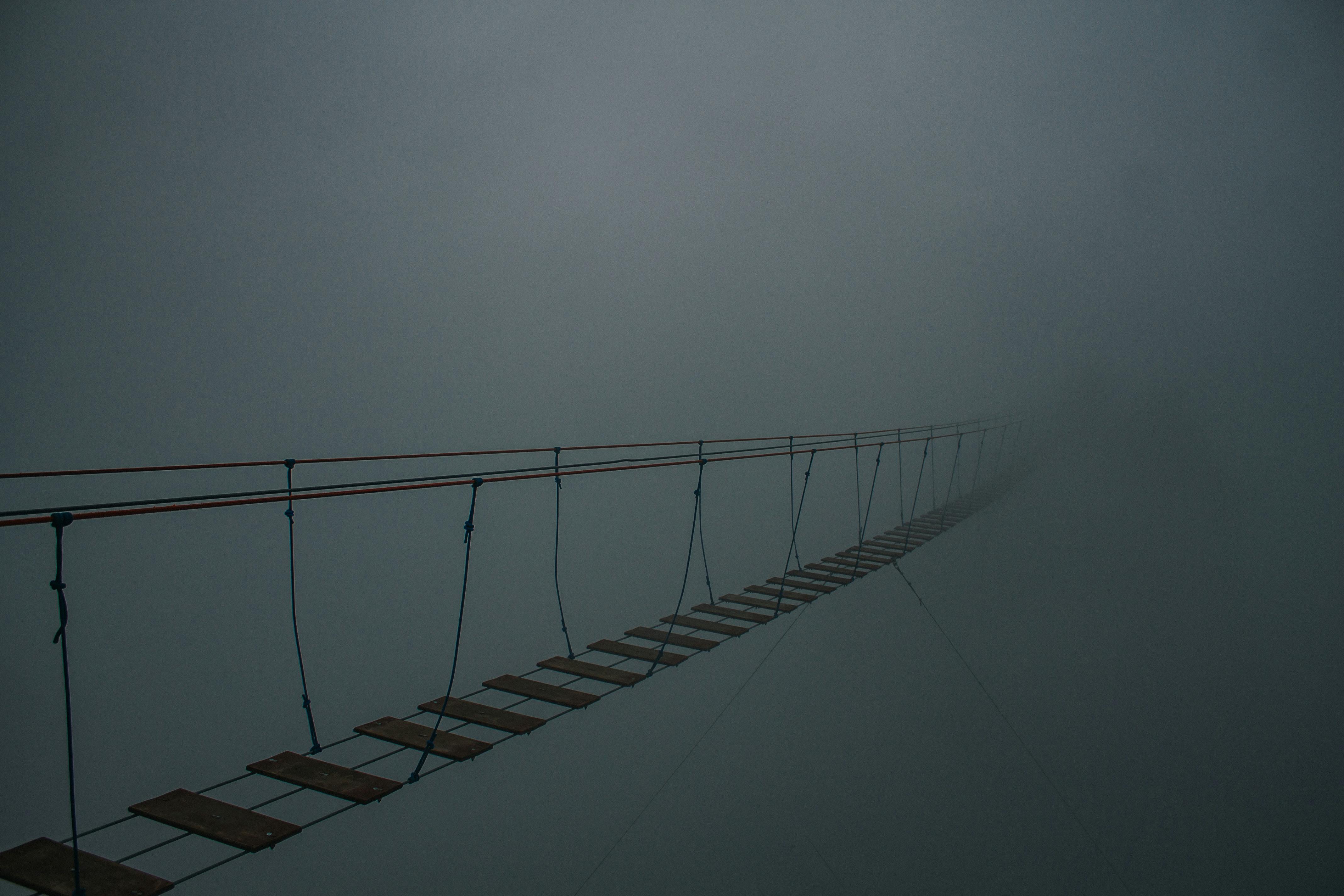 Photograph of a Bridge Surrounded by Fog · Free Stock Photo