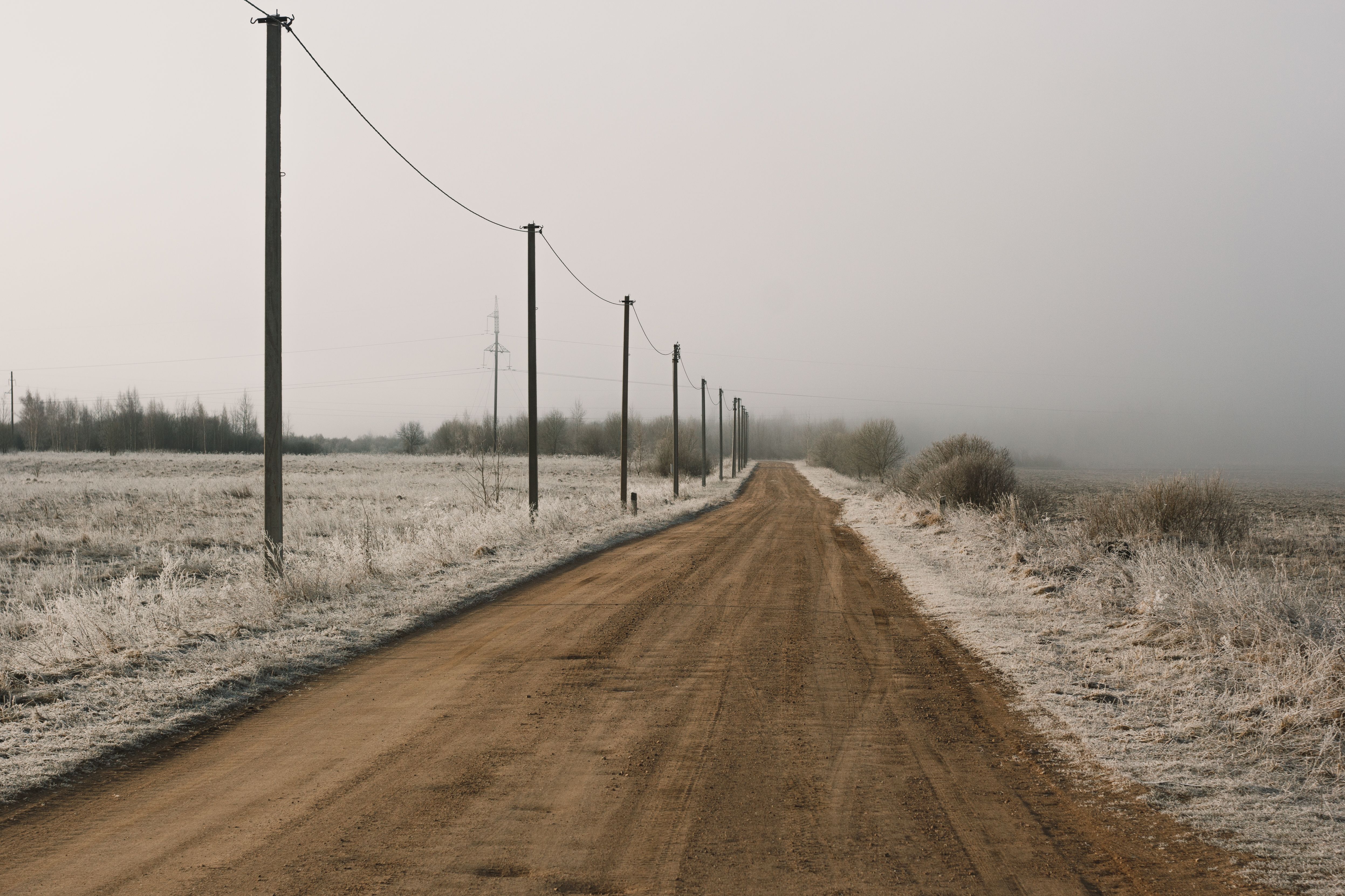 Brown Dirt Road Between Brown Grass Field · Free Stock Photo