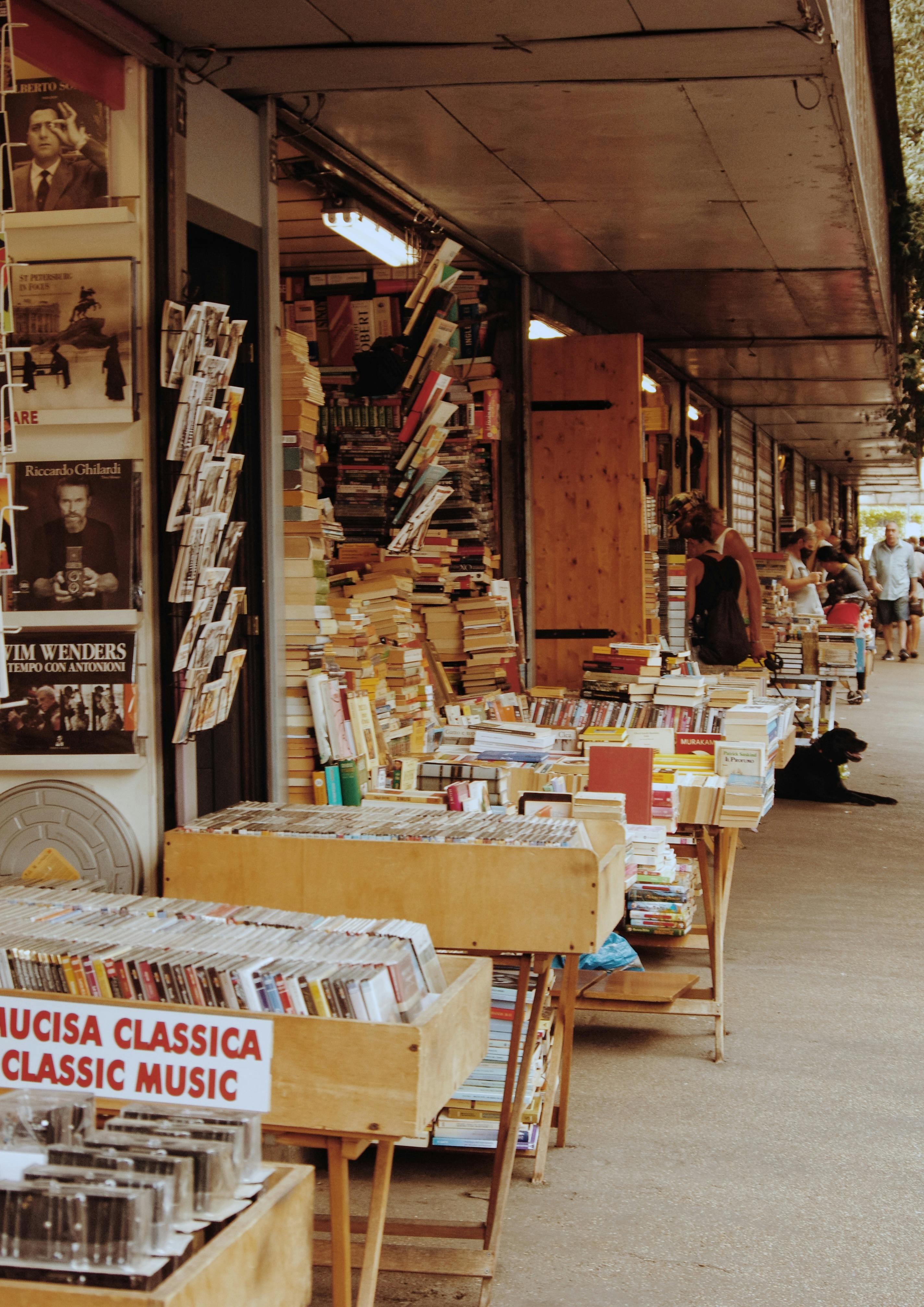 Person Wearing a Checkered Shirt in the Record store · Free Stock Photo